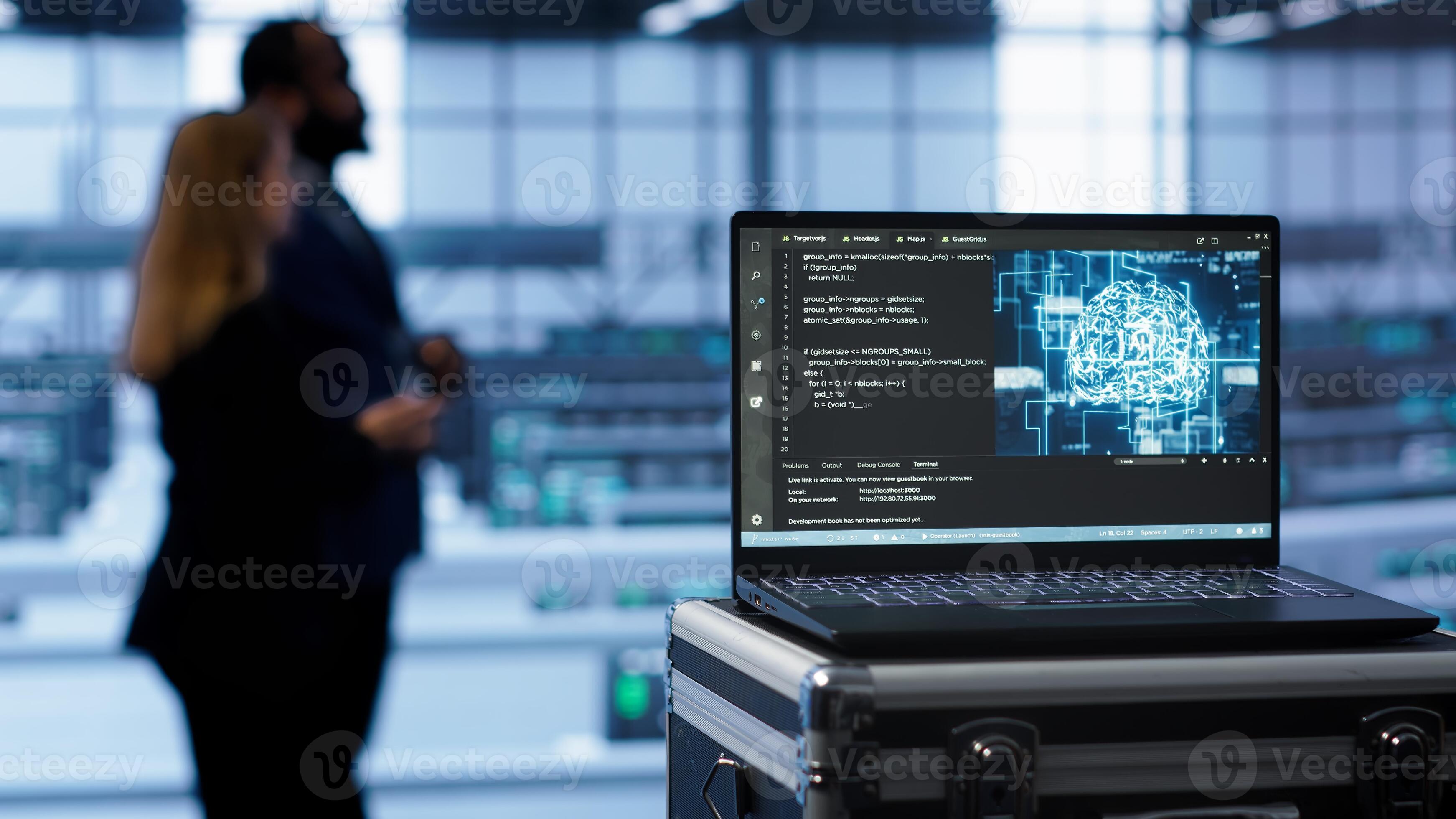 Laptop in data center facility with artificial intelligence computing simulating human brain ...