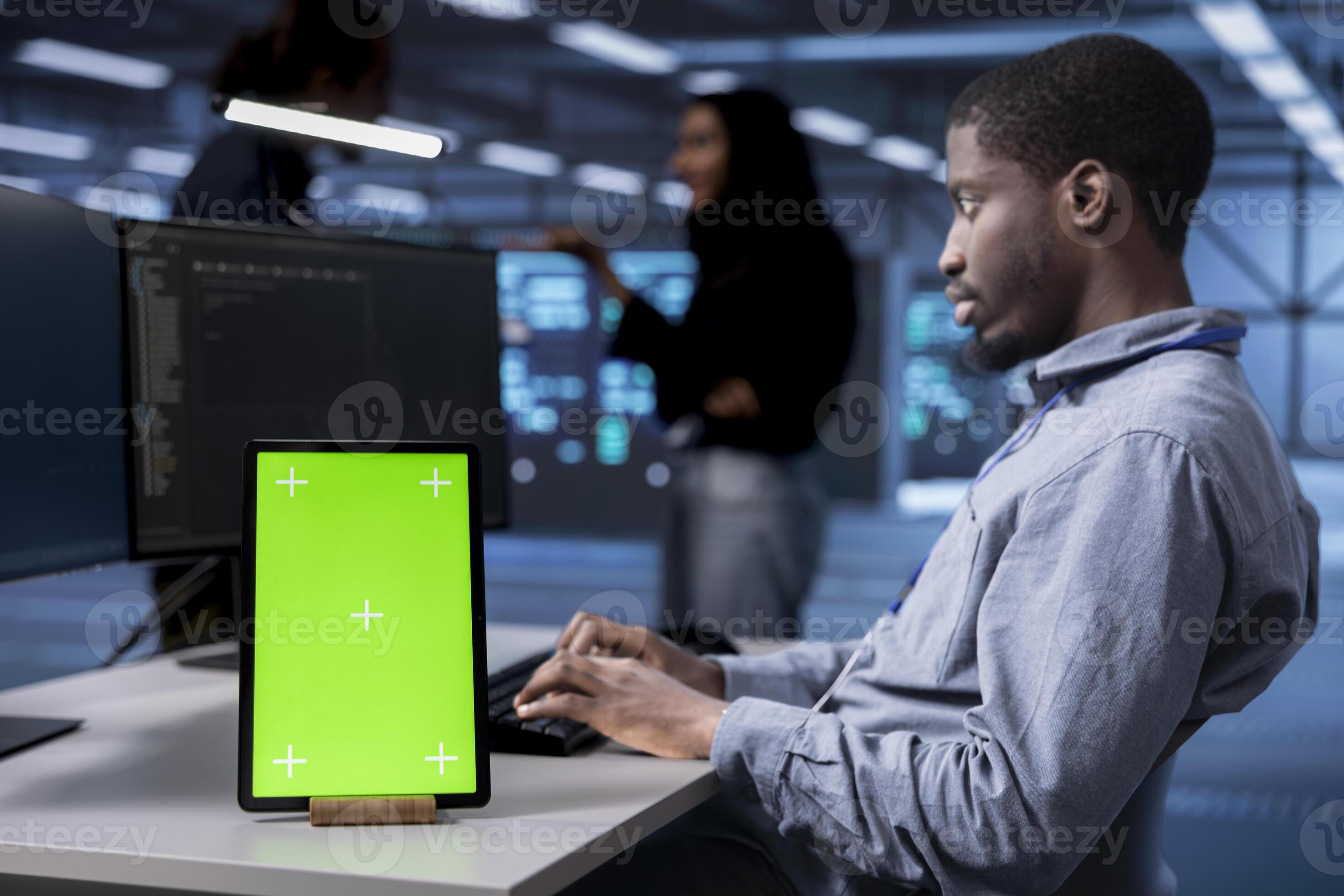 Supervisor Using Chroma Key Tablet To Reconfigure Server Room