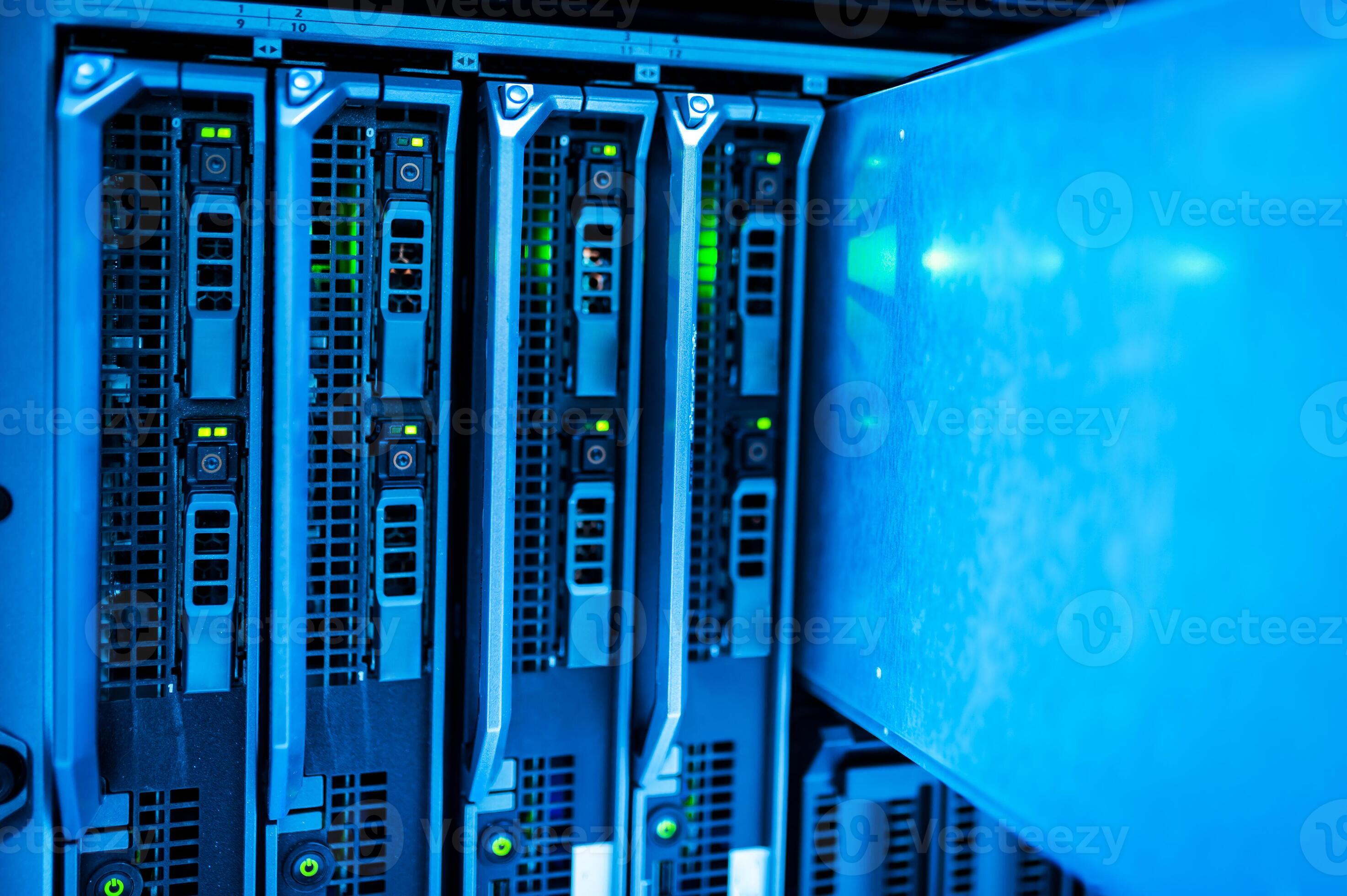 A close up of a server rack with many different types of servers ...