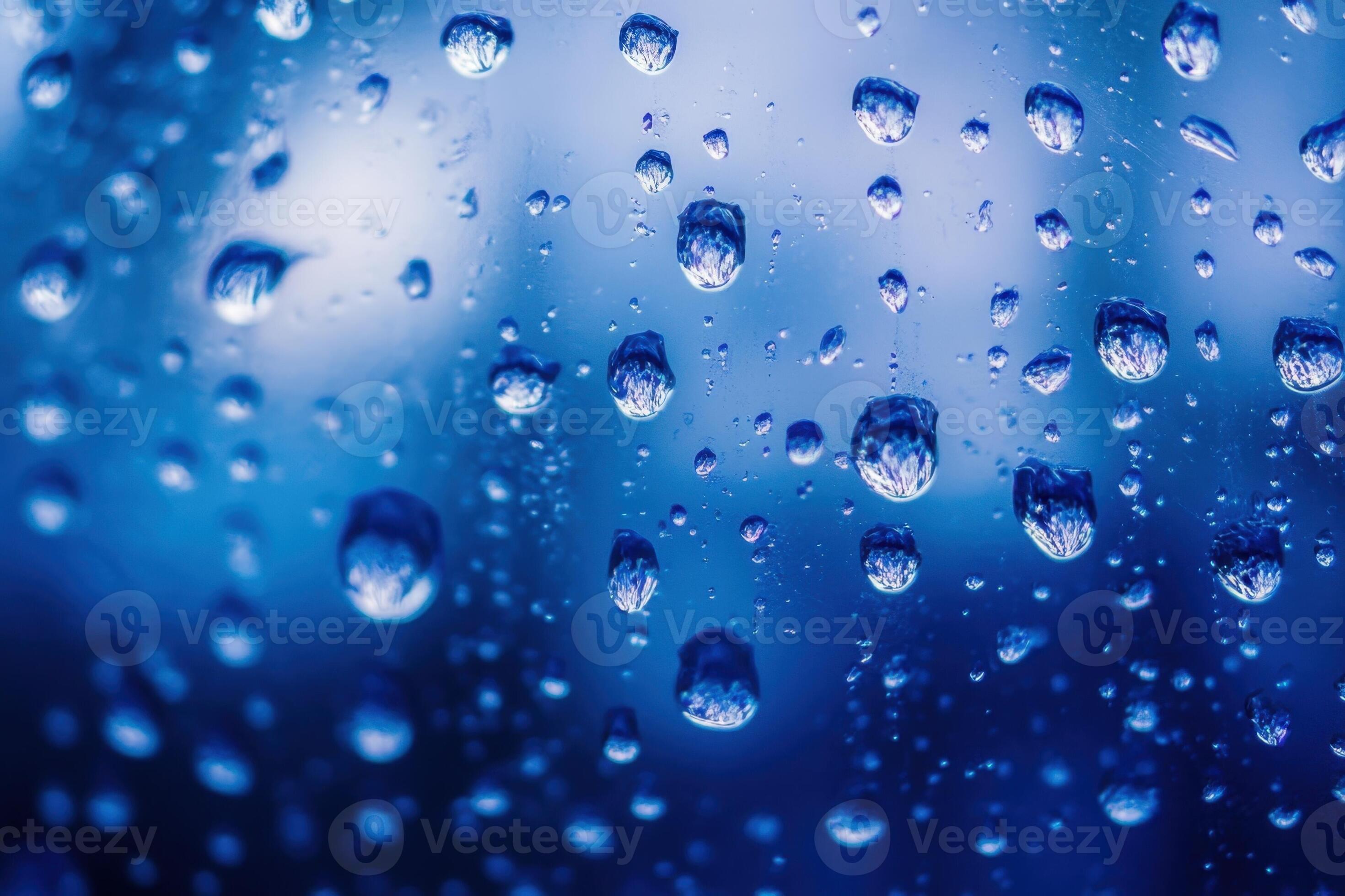 Raindrops on a Windowpane with a Blue Background. 52518141 Stock Photo at Vecteezy