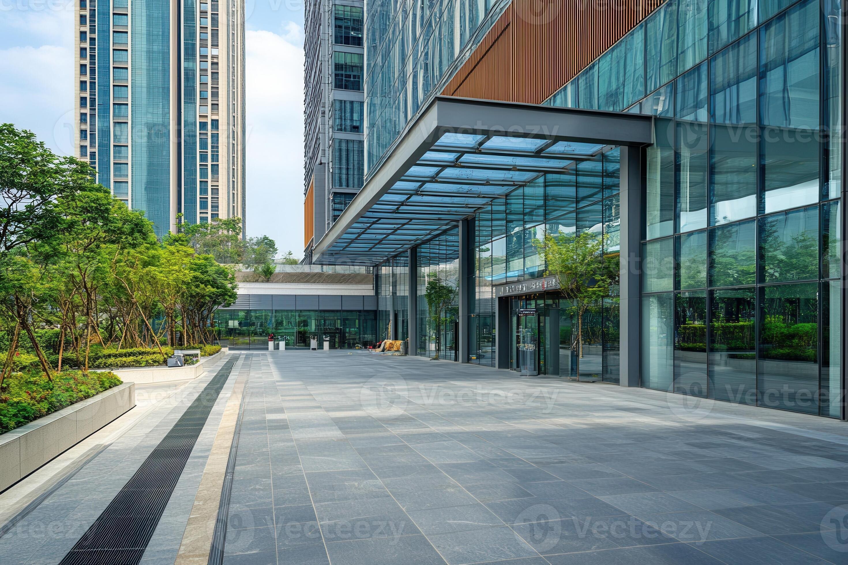 Modern glass building entrance with a canopy and paved walkway. 52518587 Stock Photo at Vecteezy