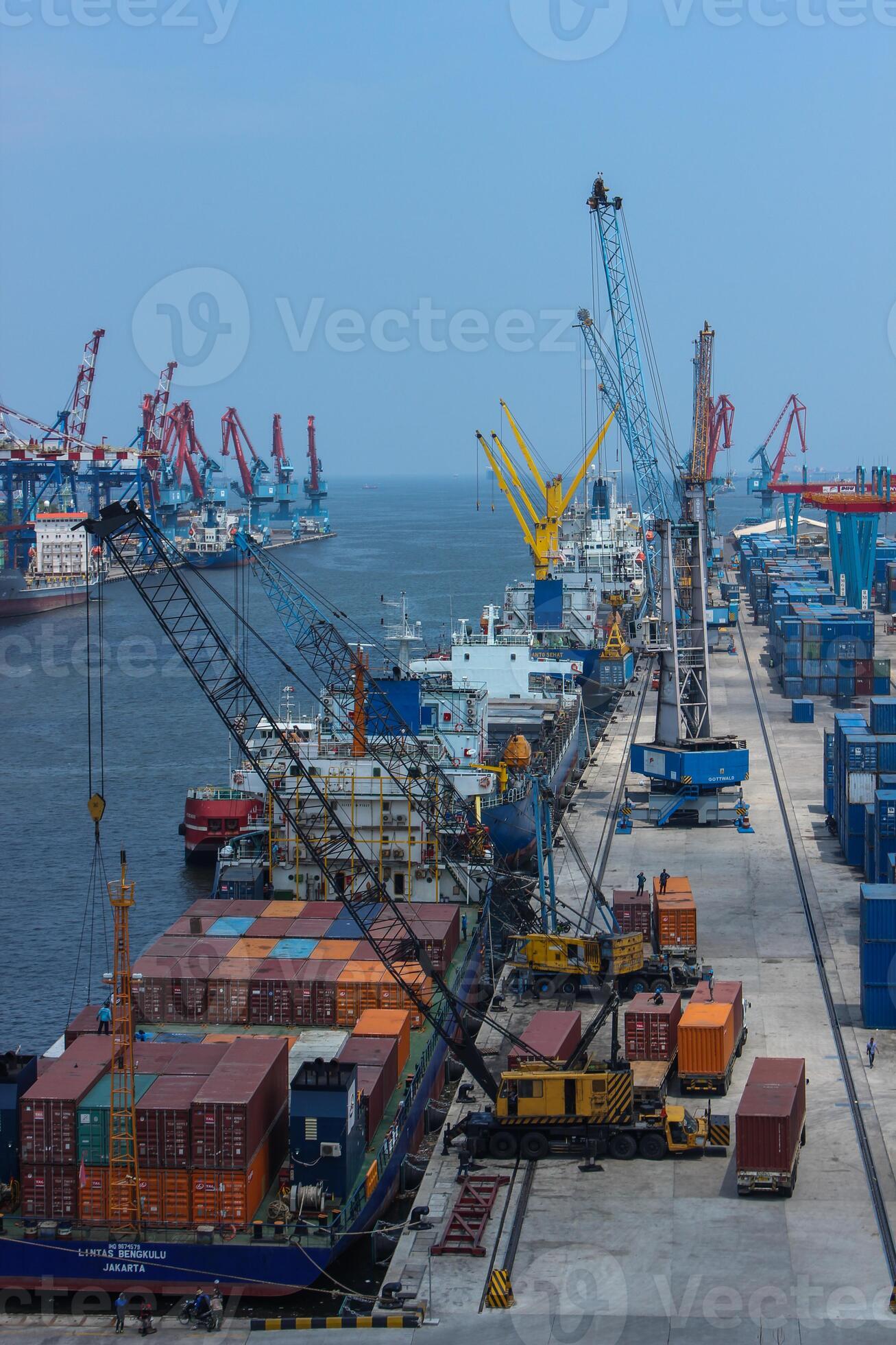 Container ship load import export and business logistic in commercial and business harbor, high ...