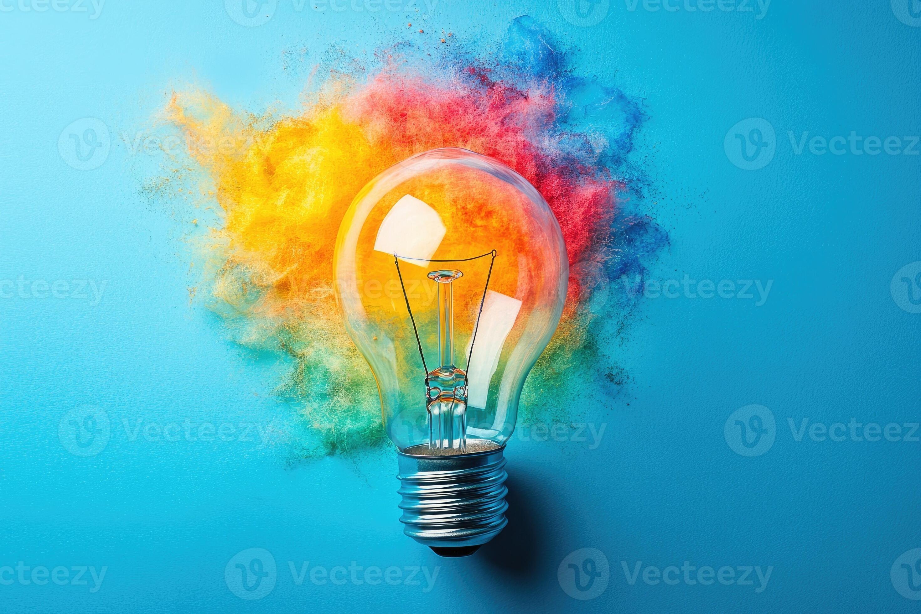Light bulb exploding with colorful powder on blue background 53027629 ... Light bulb exploding with colorful powder on blue background 53027629 ...