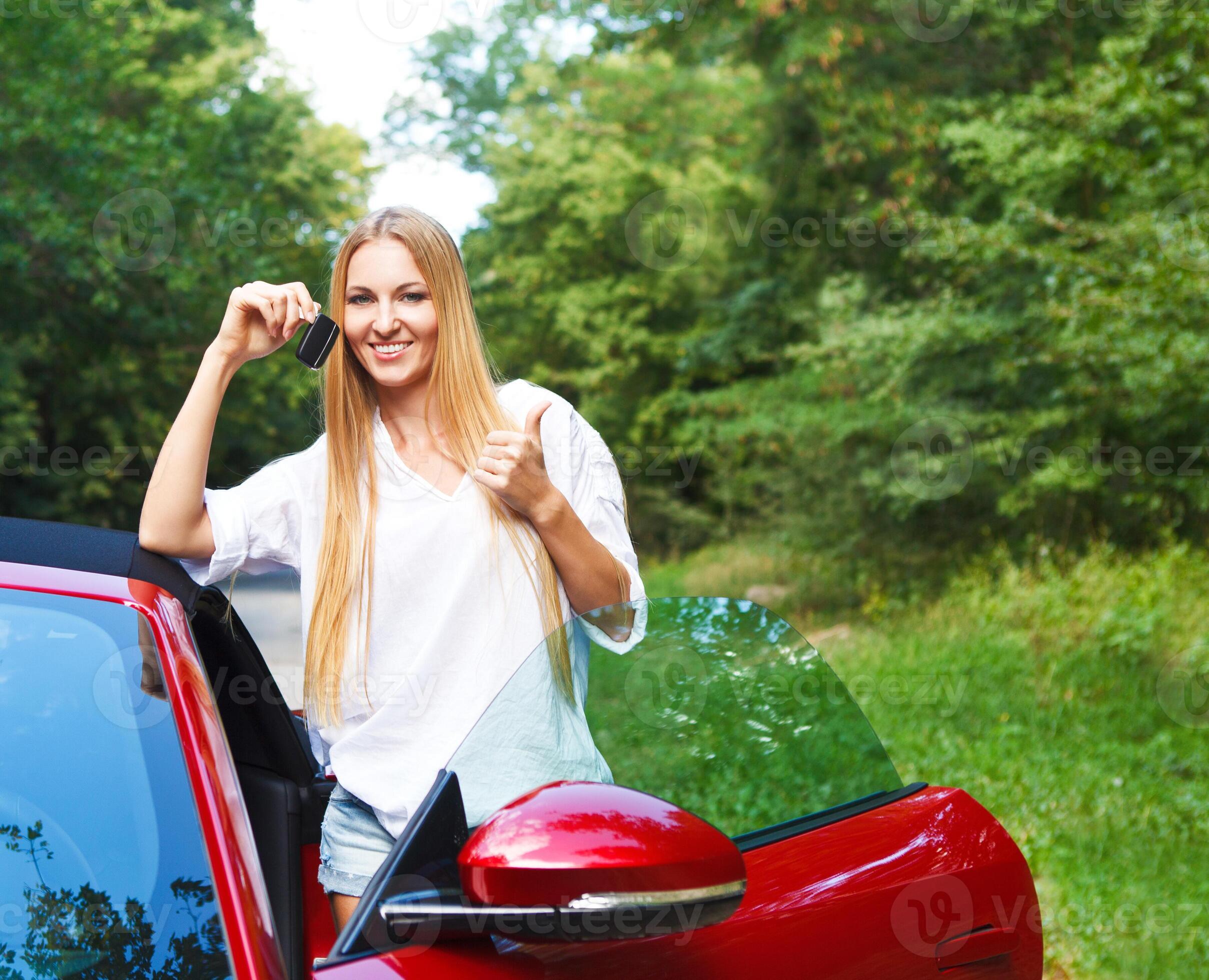 Beautiful blond young woman standing near a sports car 53032245 Stock ... Beautiful blond young woman standing near a sports car 53032245 Stock ...