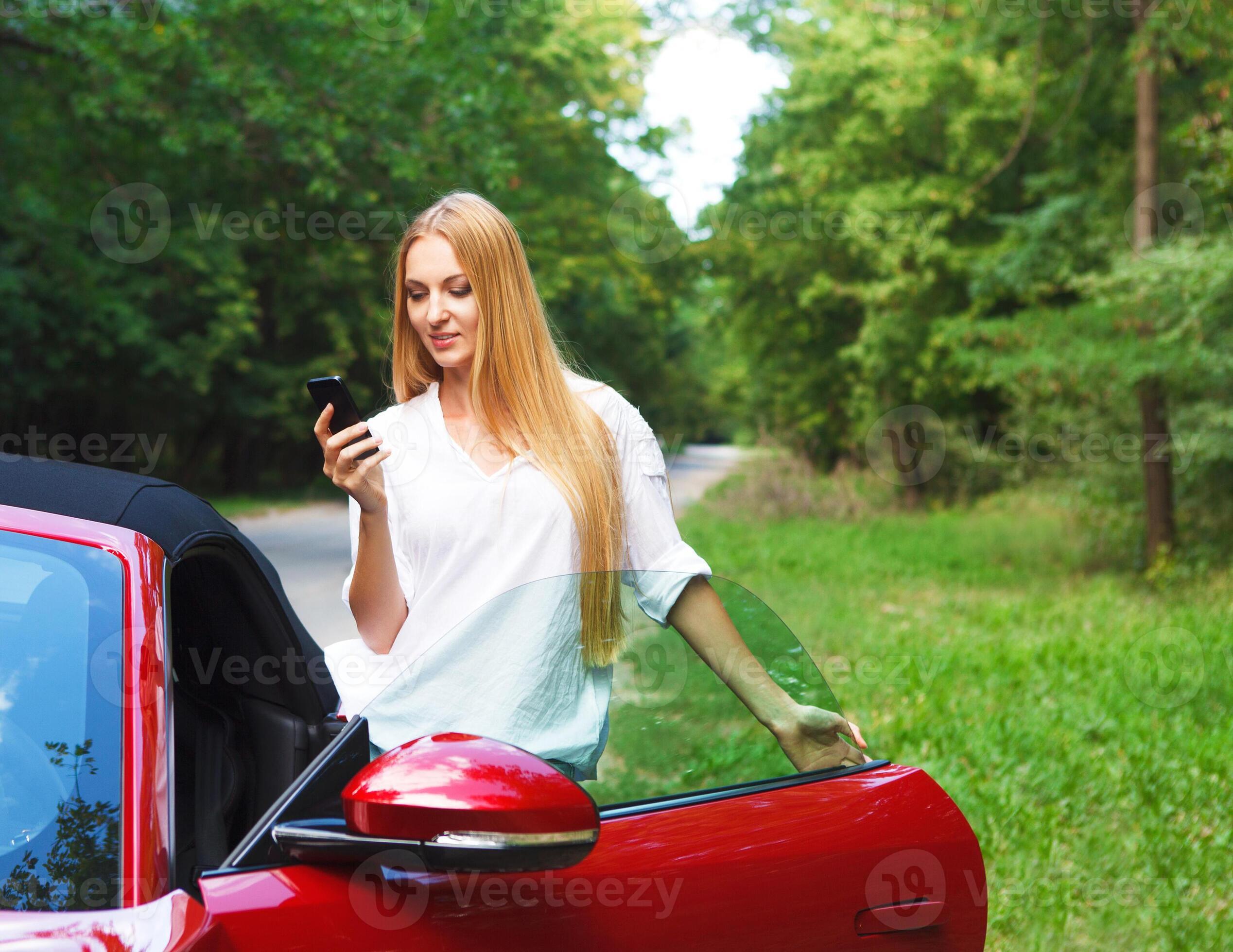 Beautiful blond young woman standing near a sports car 53032970 Stock ... Beautiful blond young woman standing near a sports car 53032970 Stock ...