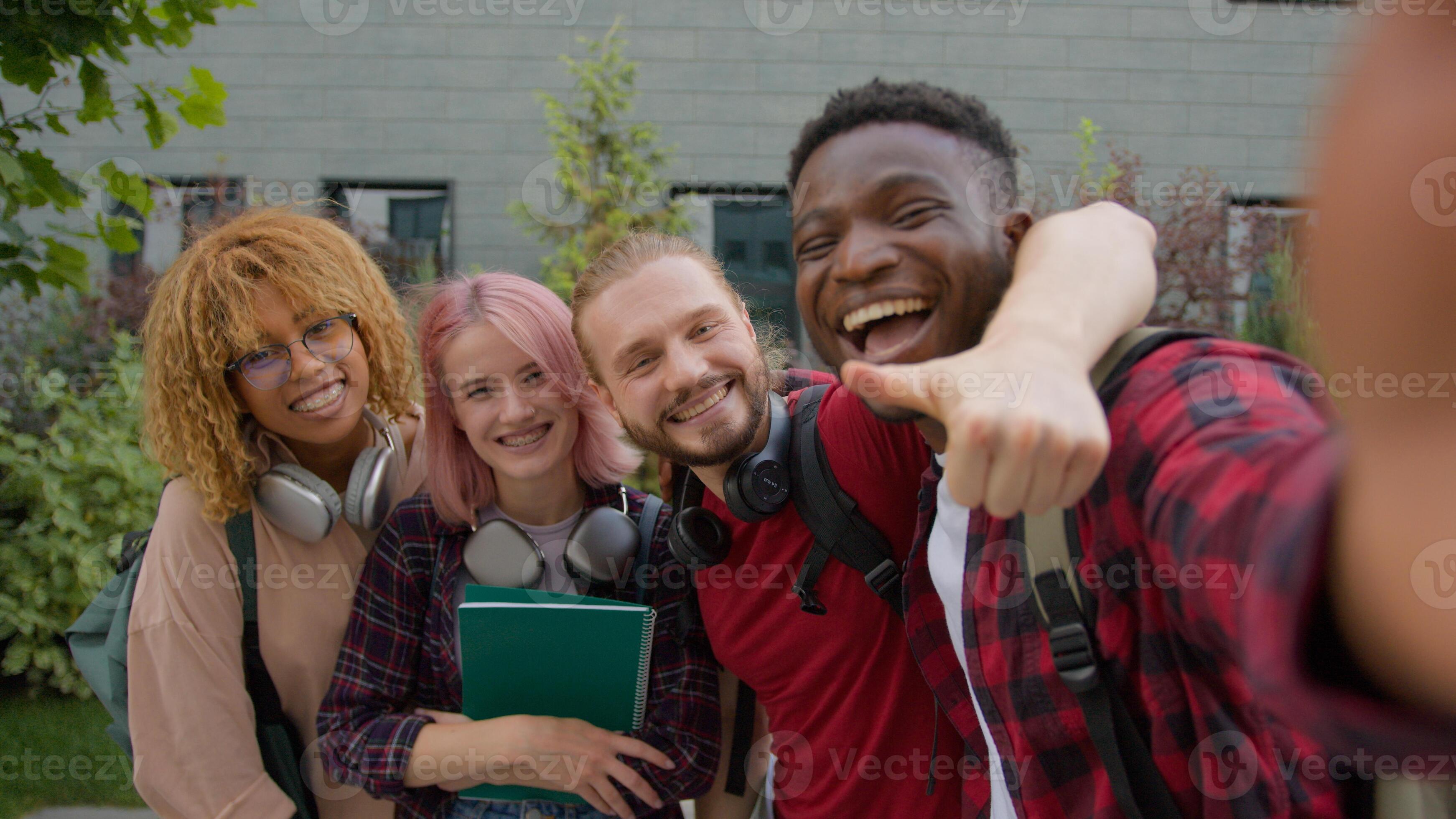 Diverse multiracial college university friends happy gen z multiethnic people teens students ...