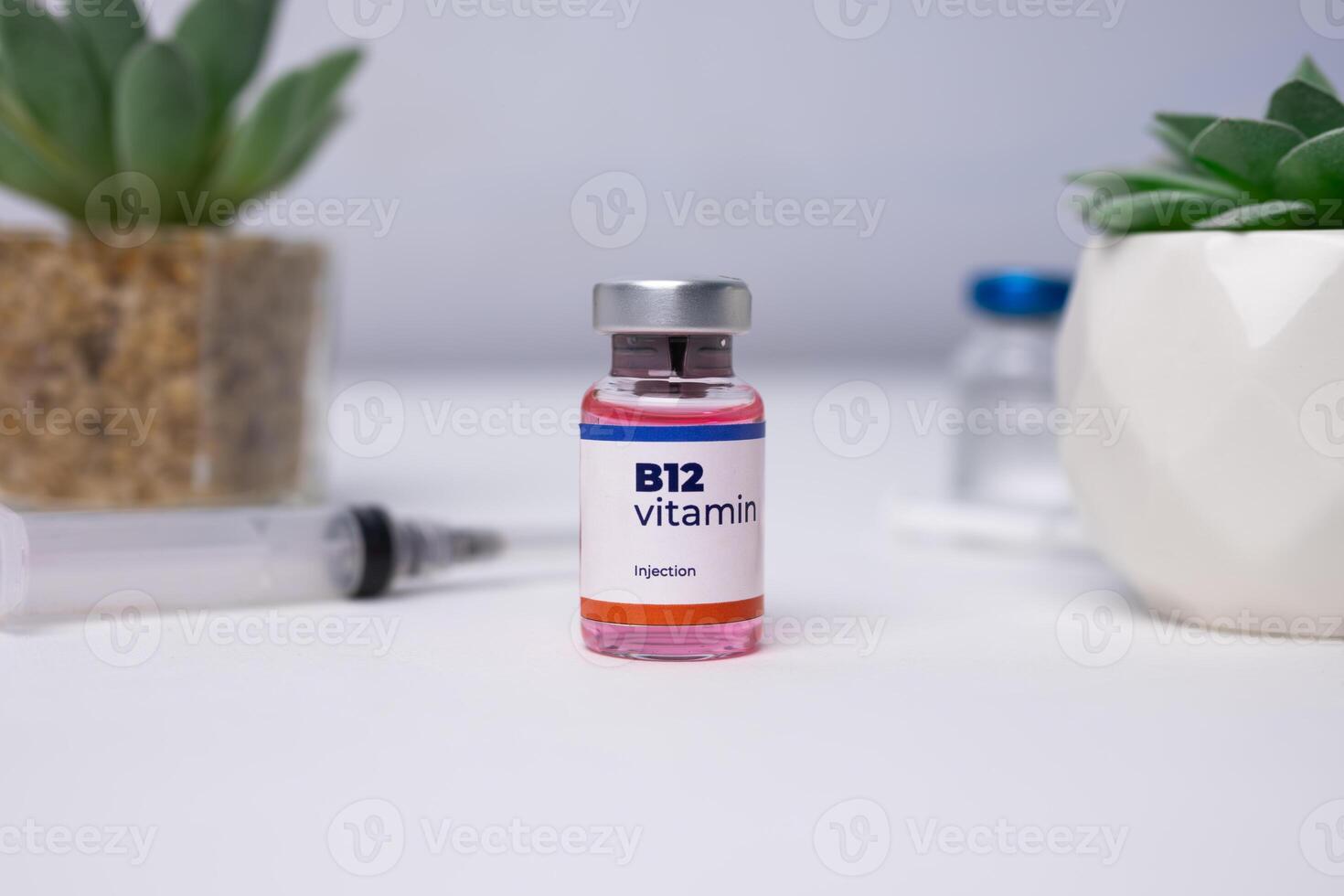 a close up of B12 Vitamin liquid sits on the white table 53081872 Stock Photo at Vecteezy