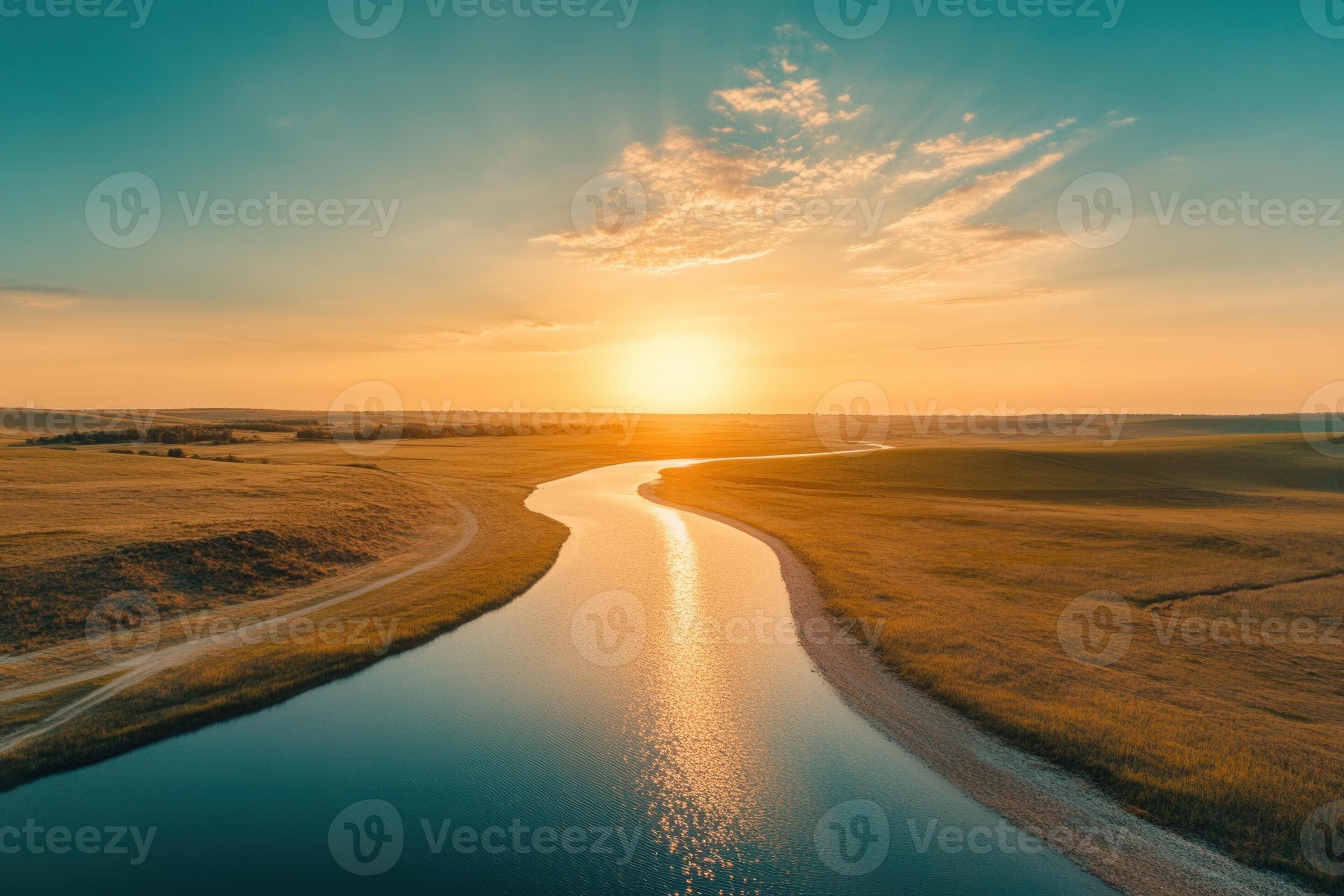 Serene sunset over a meandering river in a vast, golden landscape ... Serene sunset over a meandering river in a vast, golden landscape ...