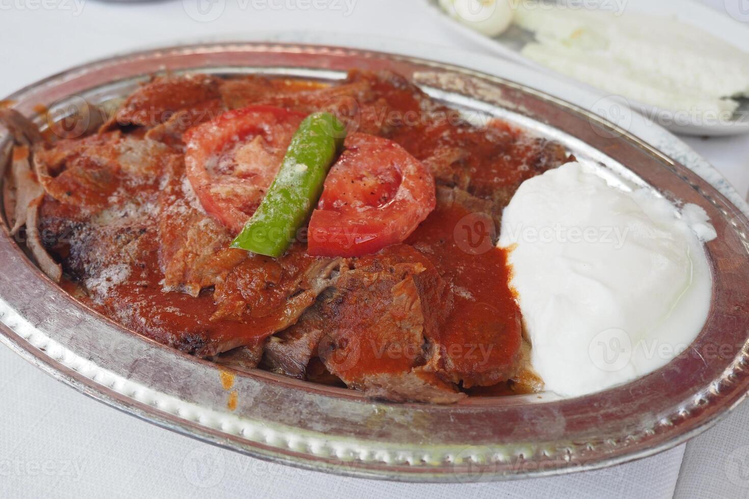 iskender Doner Kebab with butter, tomato sauce and yoghurt, Turkish ...