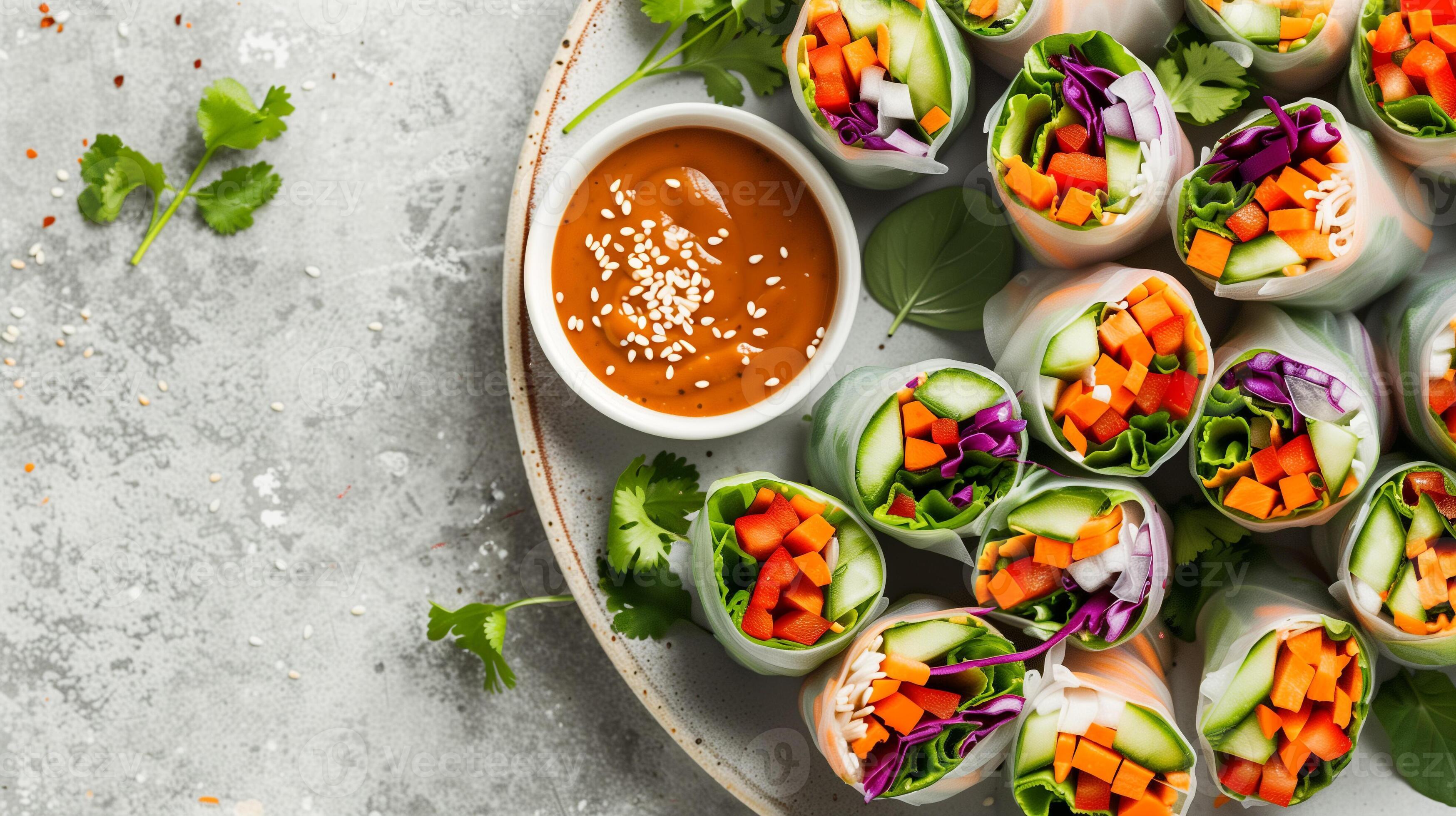 Platter of dairy-free spring rolls filled with colorful vegetables ...