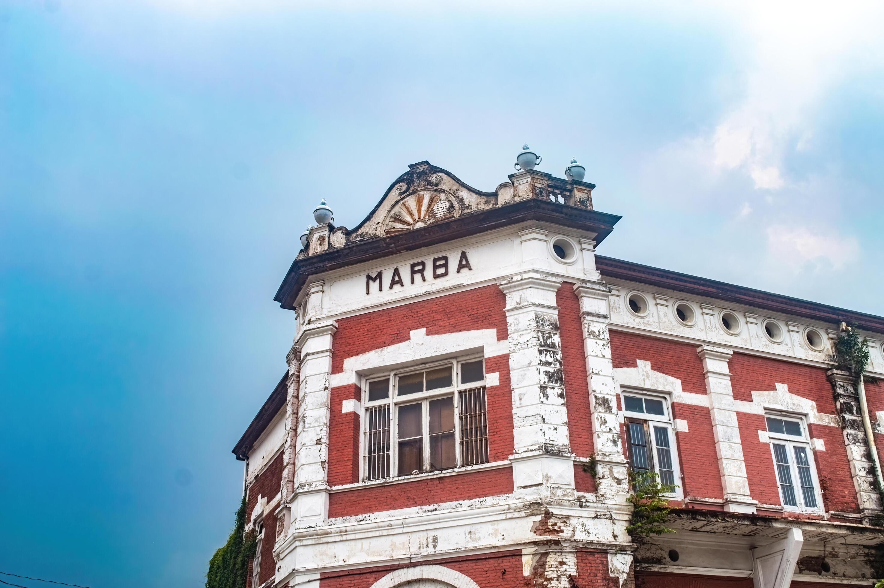 The historic Marba building in Semarang Old Town, showcasing colonial architecture with its red ...