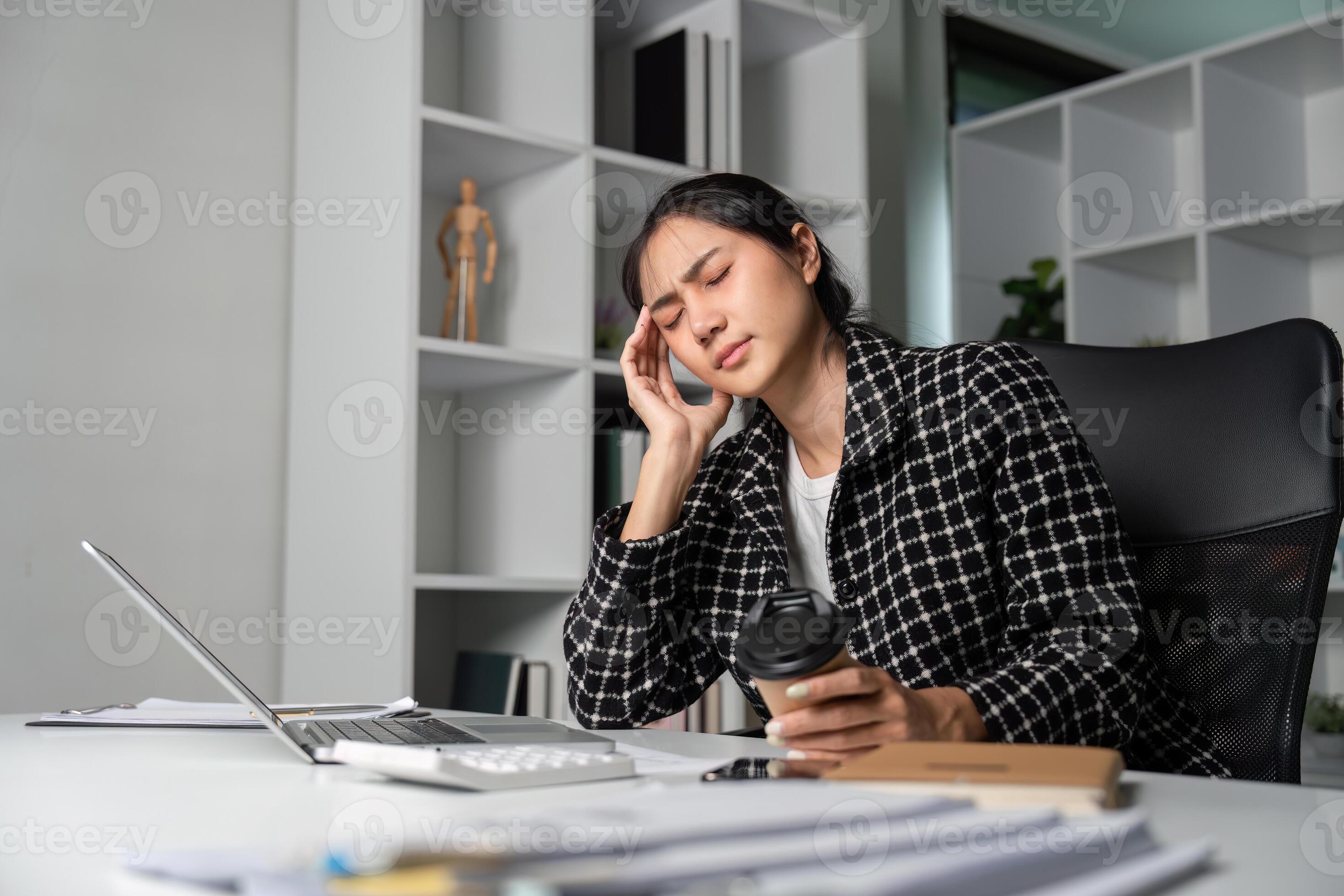 Young Business Woman Stressed from Overworking at Office Desk with ... Young Business Woman Stressed from Overworking at Office Desk with ...