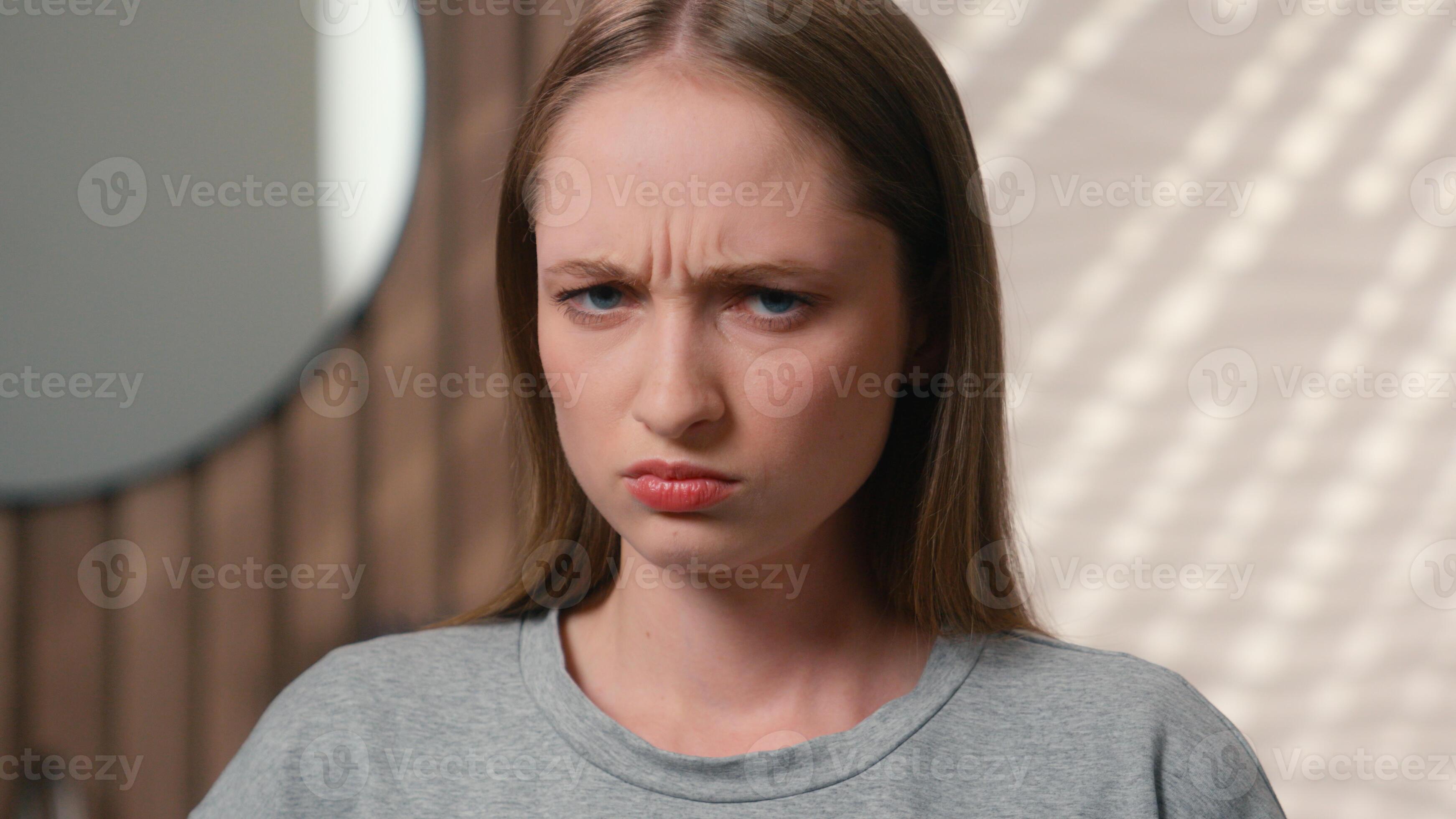 Female portrait in home bathroom sad displeased offended woman ...