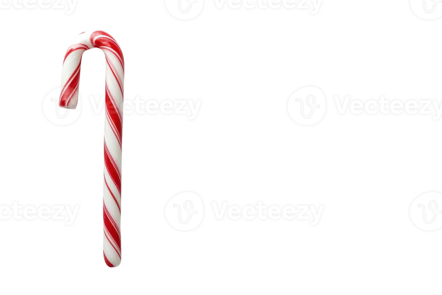 Colorful candy cane sits on a plain surface, evoking festive holiday ...