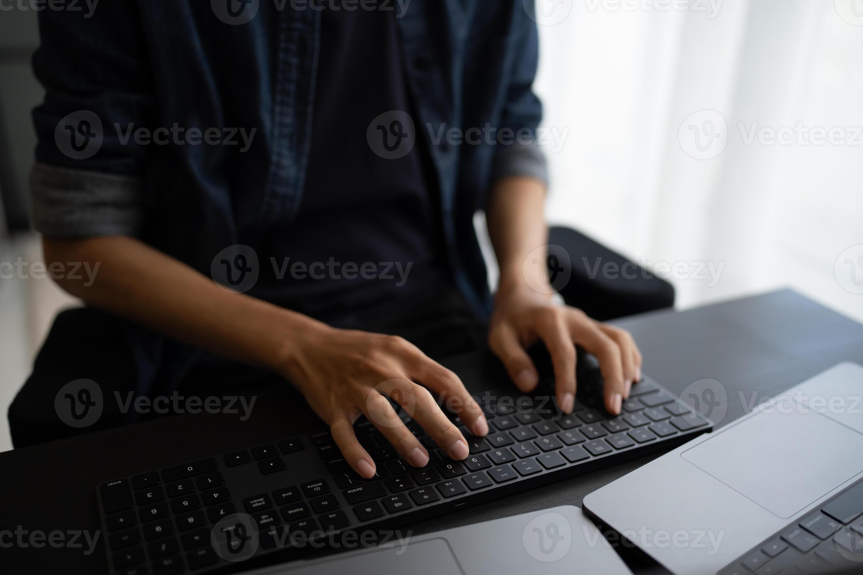 Asian man software engineer Working on Computer at office desk for ... Asian man software engineer Working on Computer at office desk for ...