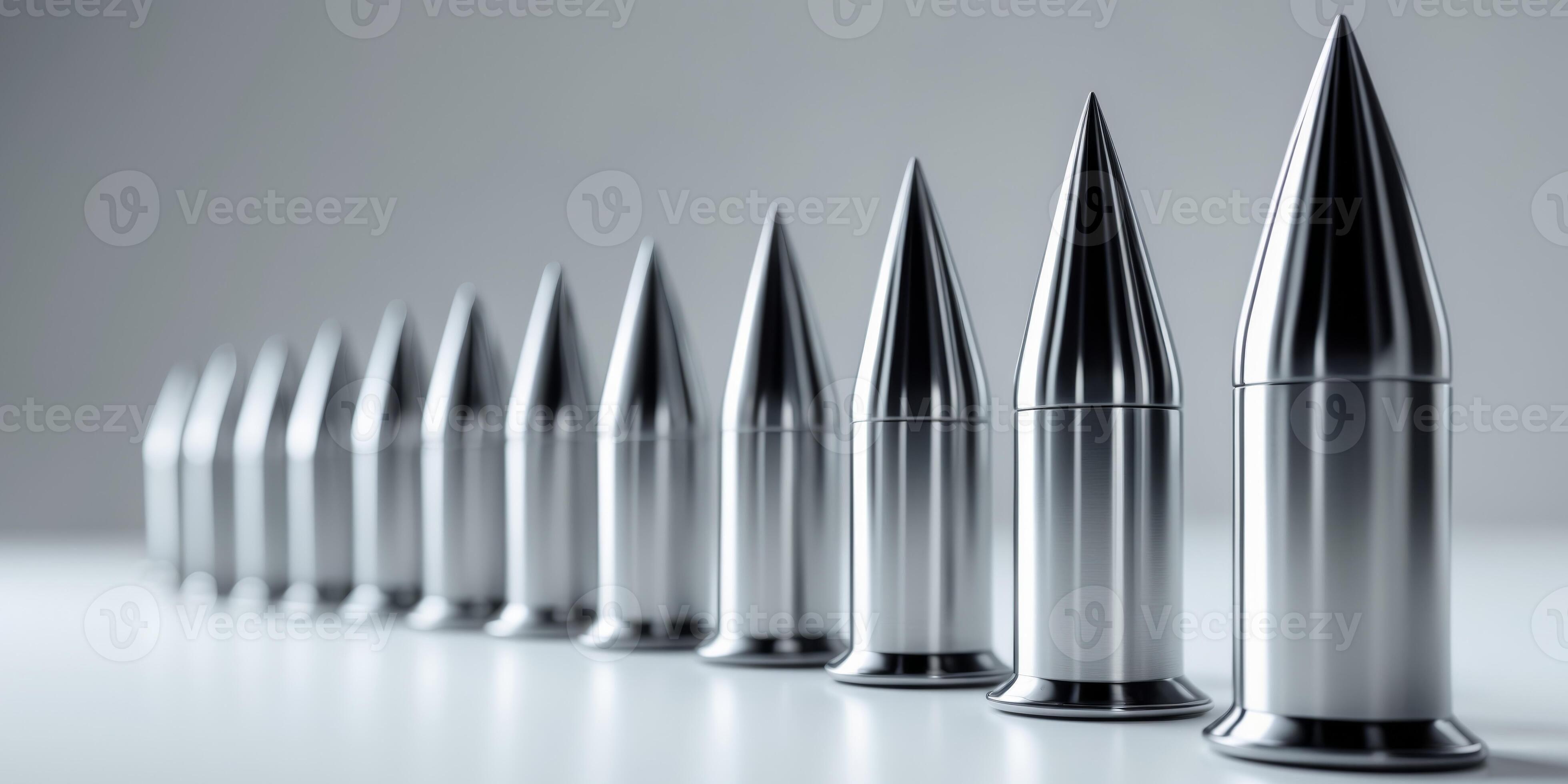 A row of sharp metal objects are lined up on a white surface 54392452 Stock Photo at Vecteezy
