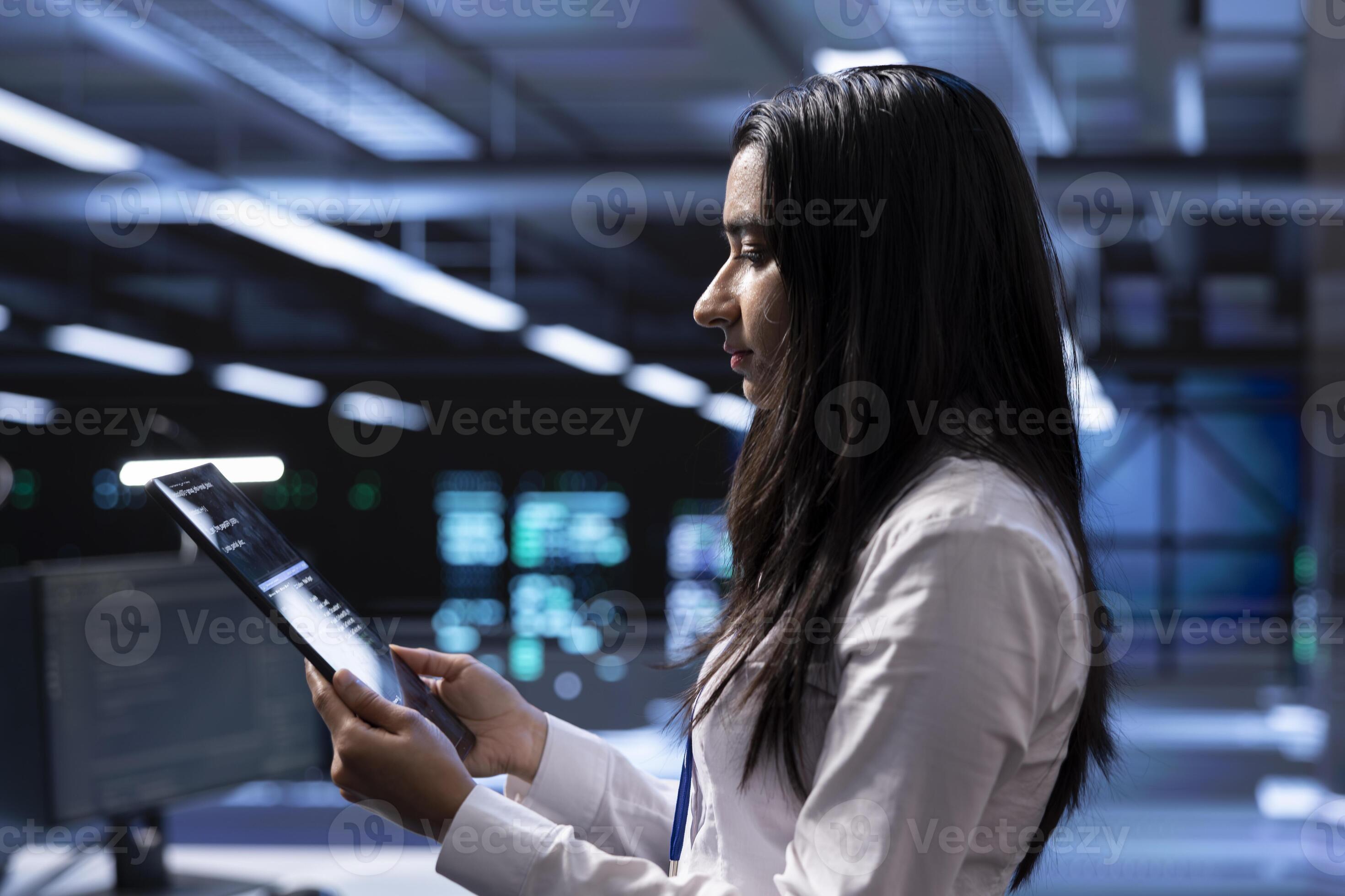 Engineer In Data Center Updating Systems To Keeps Performance Up And Protect Servers From Easily