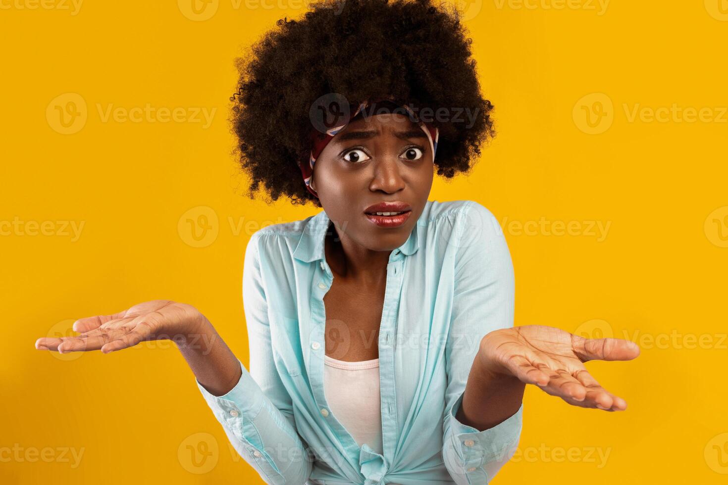 I Don't Know. Puzzled Displeased African Lady Shrugging Shoulders ...