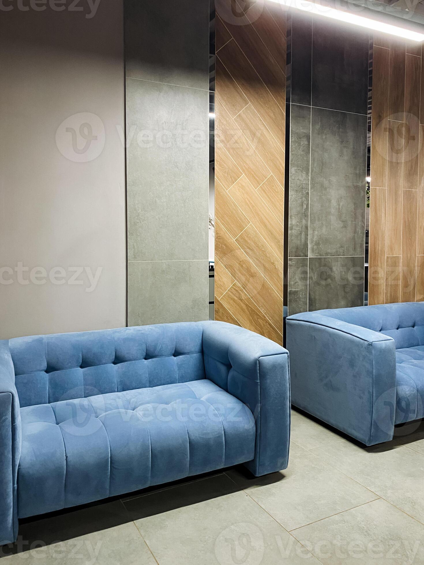 In the cozy living room, there are two beautiful blue couches placed ... In the cozy living room, there are two beautiful blue couches placed ...