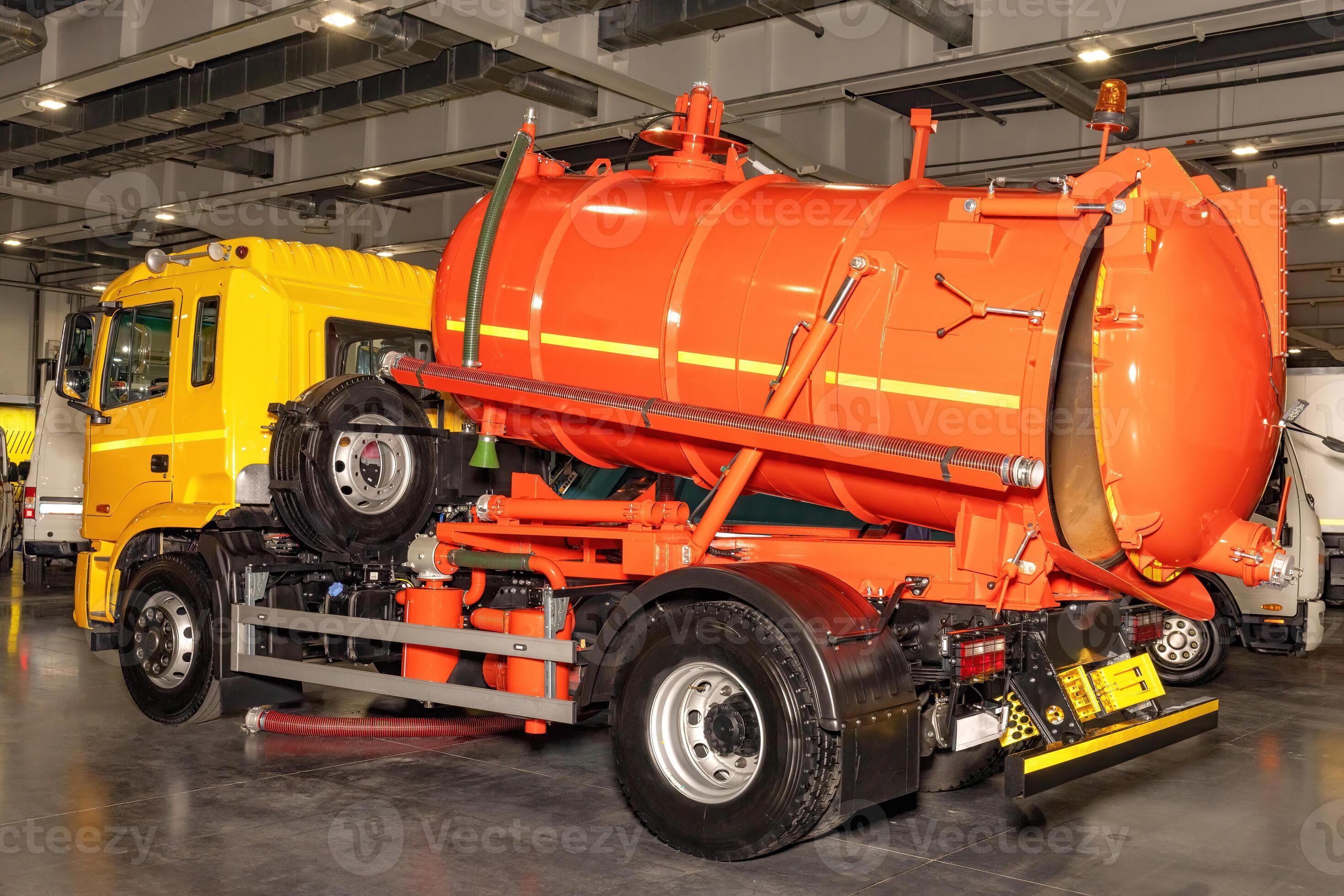 Bright orange industrial truck poses in a modern warehouse during a busy workday 54877063 Stock ...