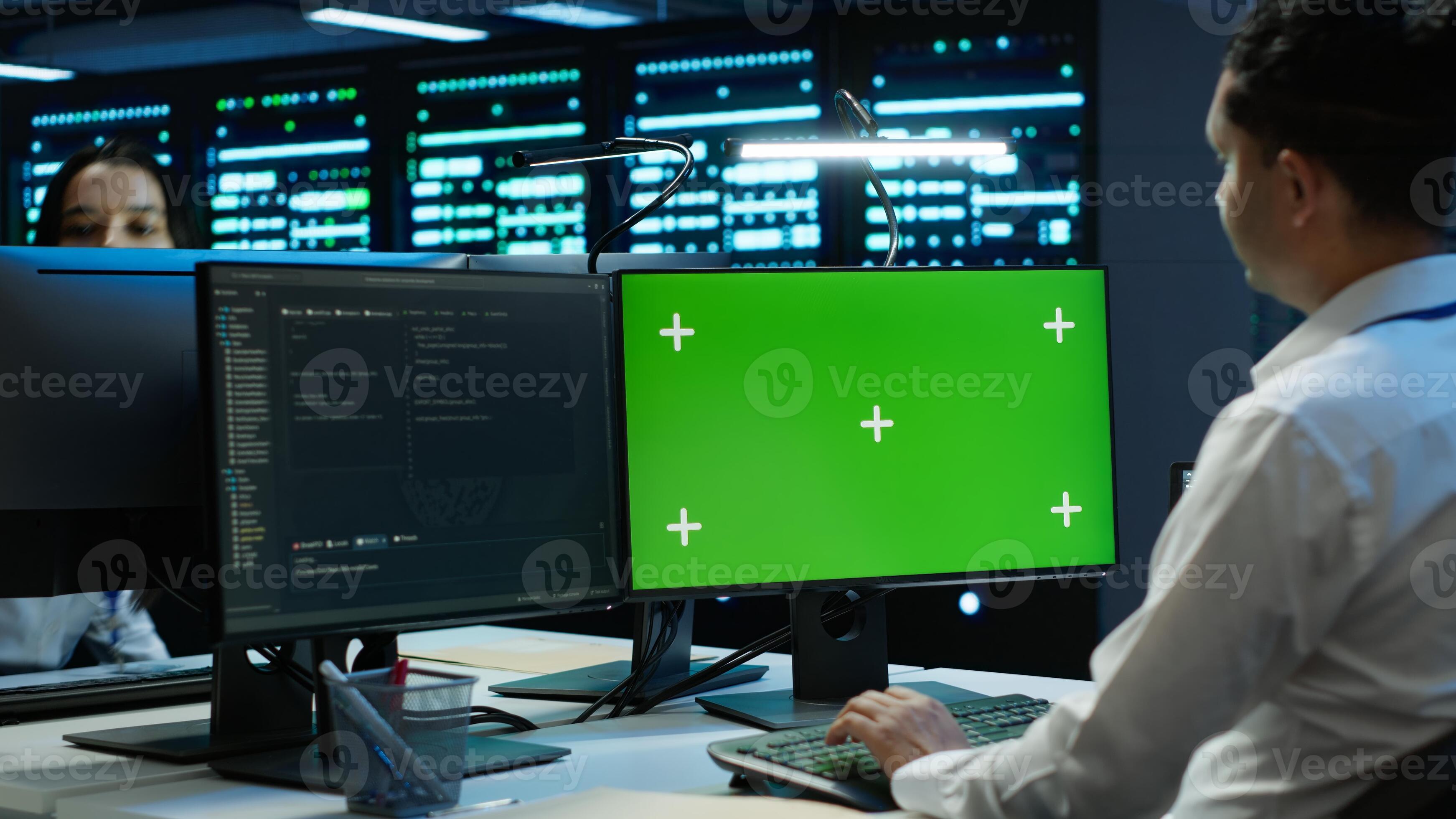 Engineer In Data Center Monitoring Security Threats Using Mockup