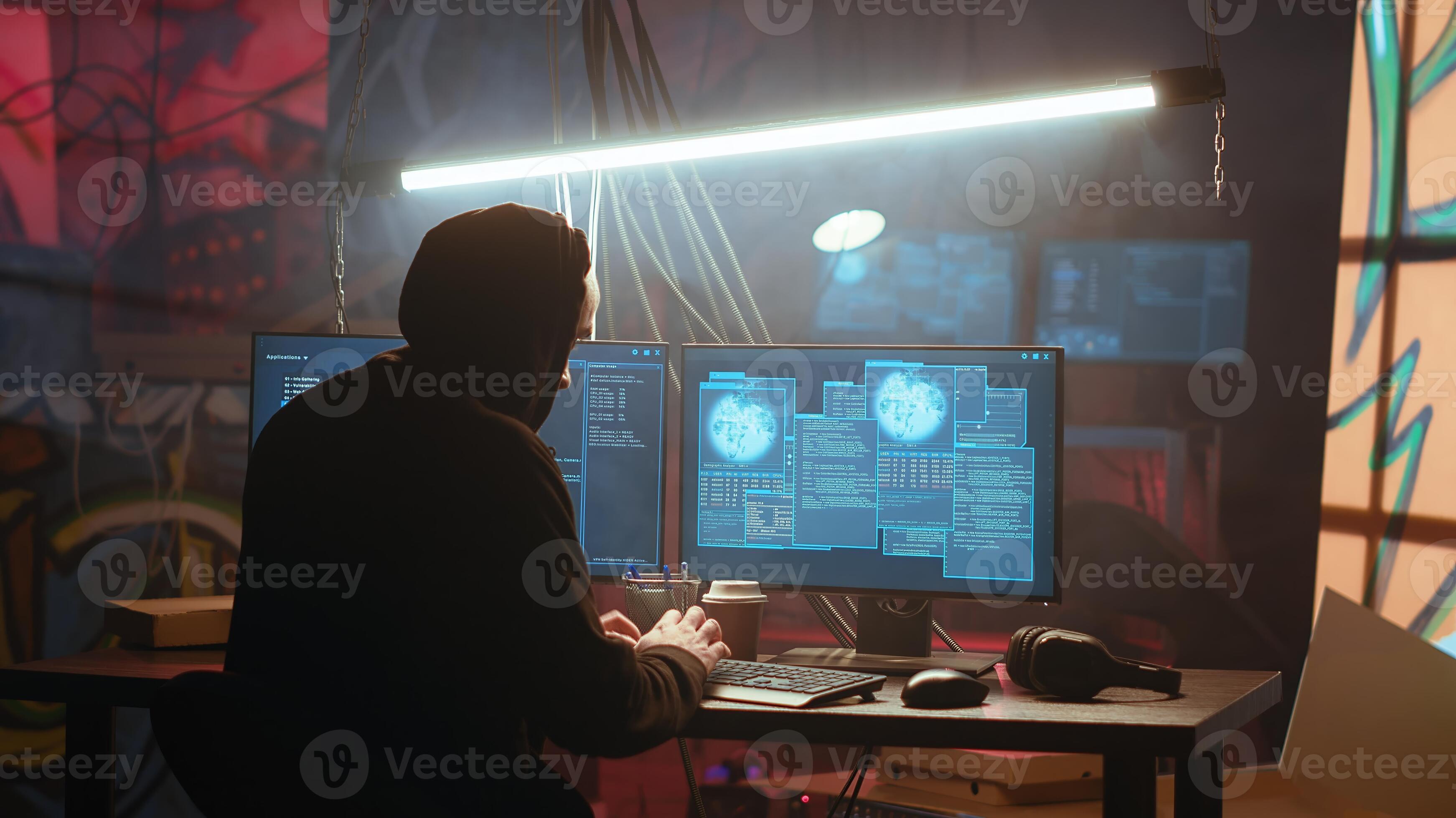 Hacker Using High Tech Computer System To Run Malicious Code In Foggy