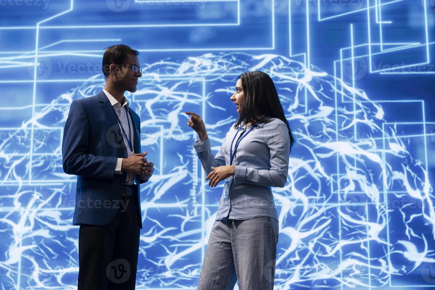 Engineering team colleagues doing brainstorming, analyzing AI models. Coworkers discussing ...