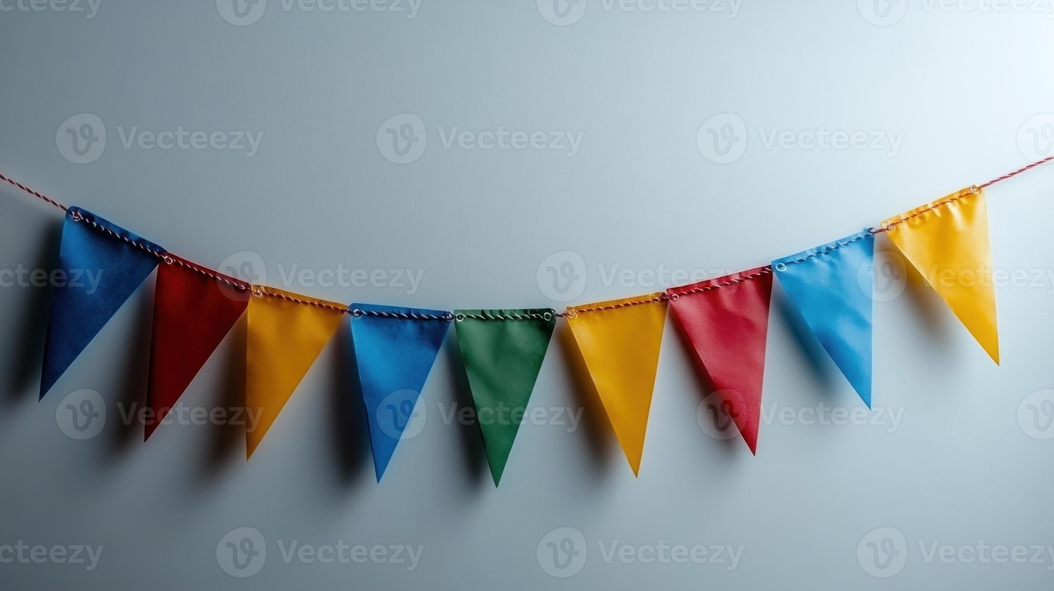Brightly colored triangular flags hang in a cheerful display, enhancing ...