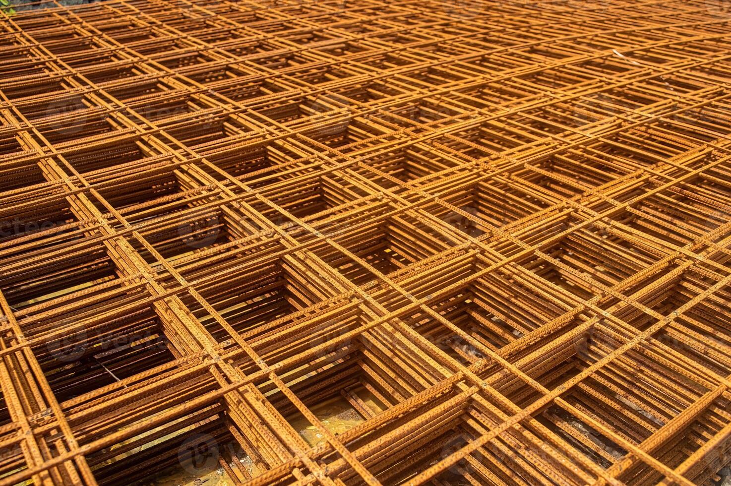 A Rusty Rebar Grid Used In Construction For Reinforcing Concrete Structures Showcasing The