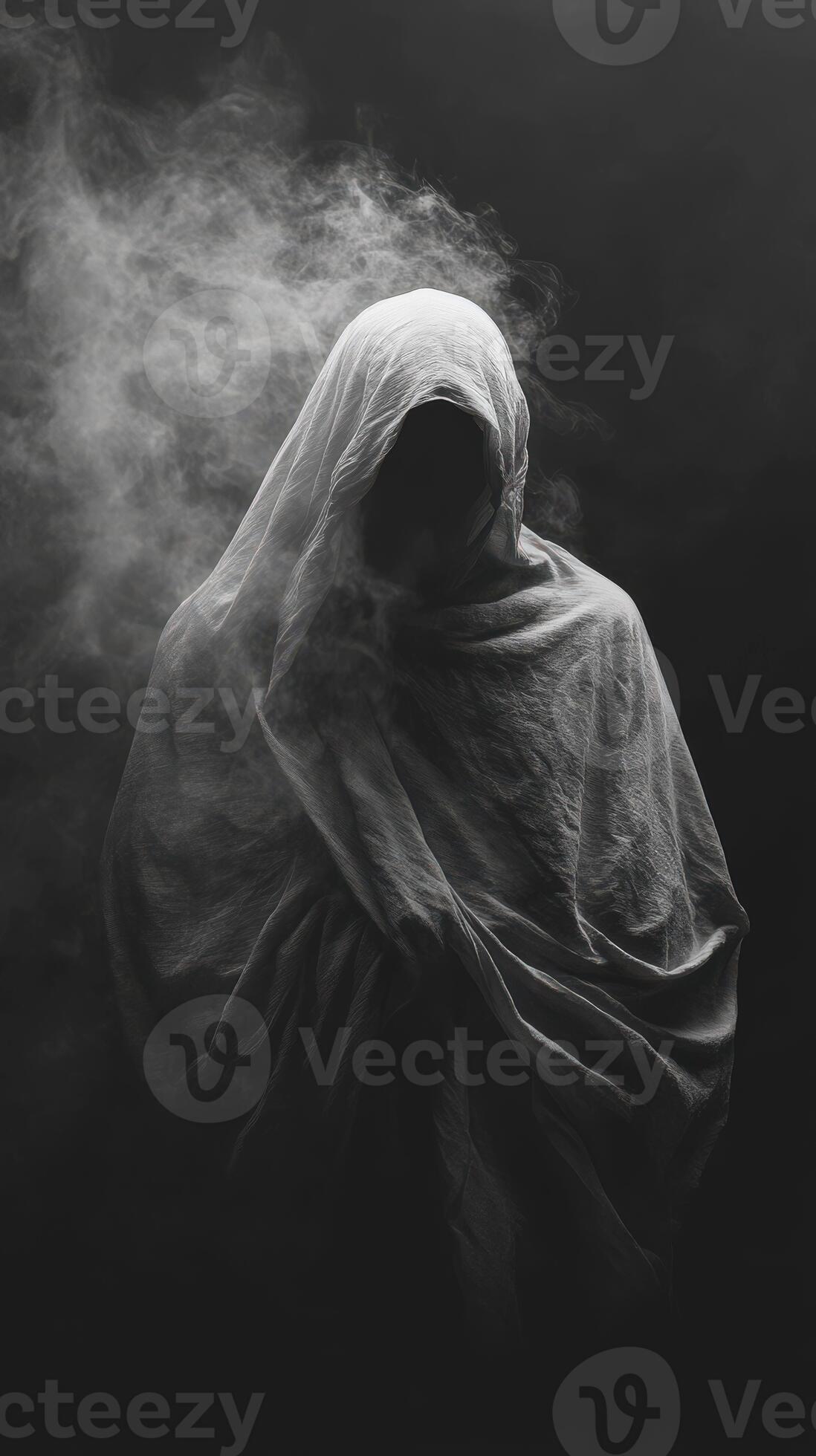 Dark figure shrouded in mist conveying an eerie presence in a dim setting 55090154 Stock Photo ...
