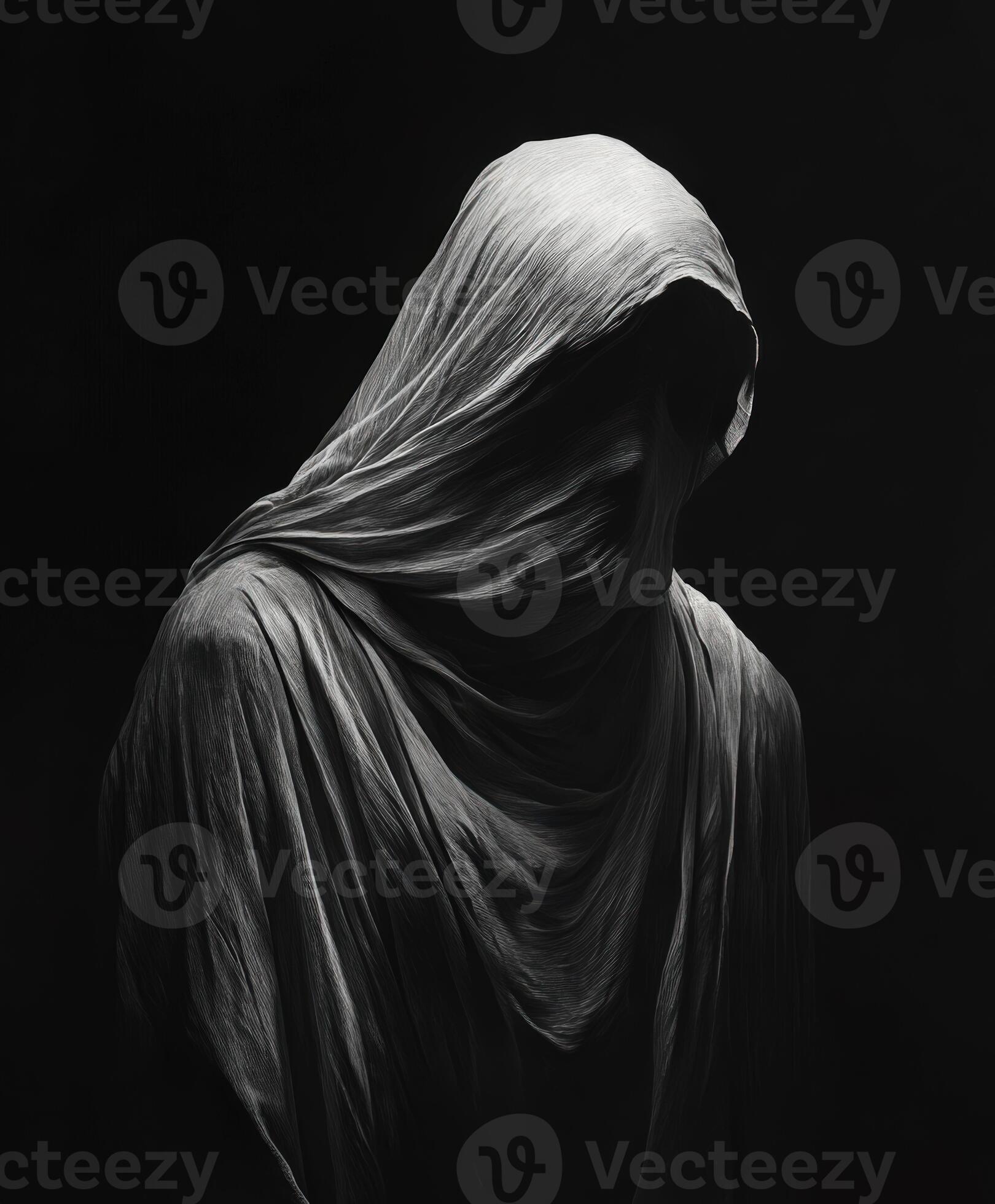 Mysterious figure shrouded in a dark hooded cloak in low light setting 55090178 Stock Photo at ...
