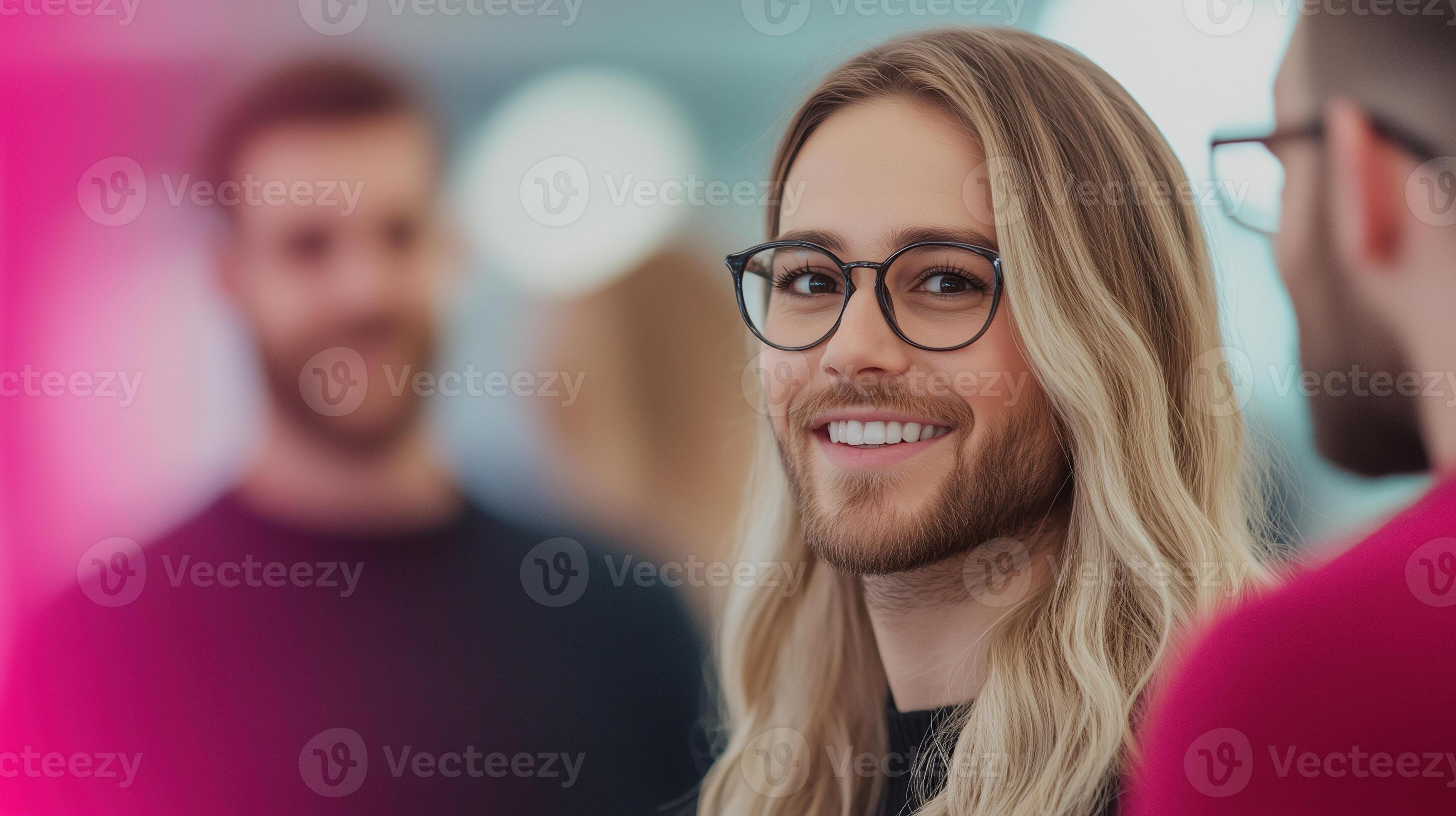 Smiling Transgender Person With Glasses in Social Setting Emphasizing ...