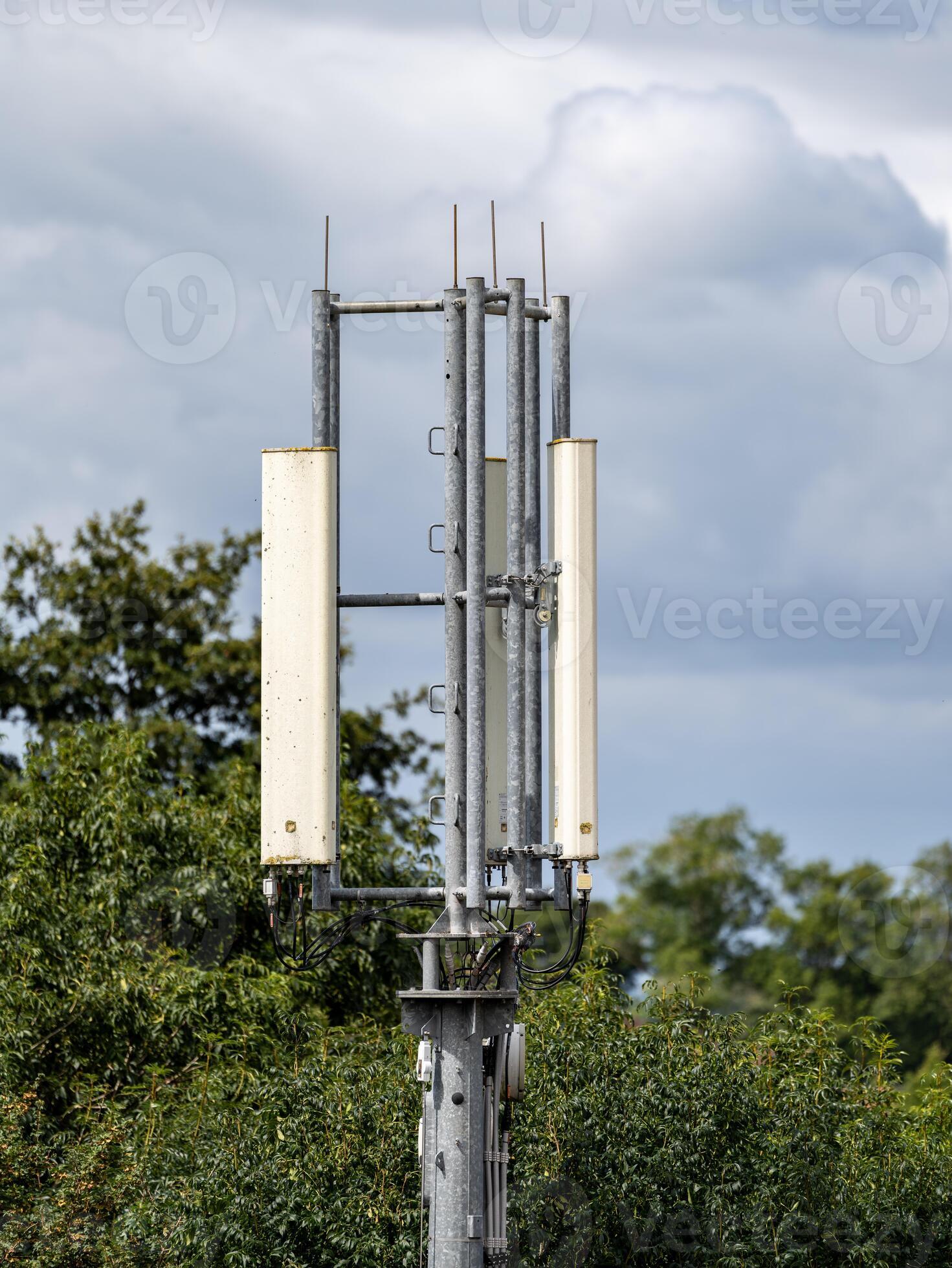 Telecommunication tower providing wireless communication under cloudy sky 55096187 Stock Photo ...
