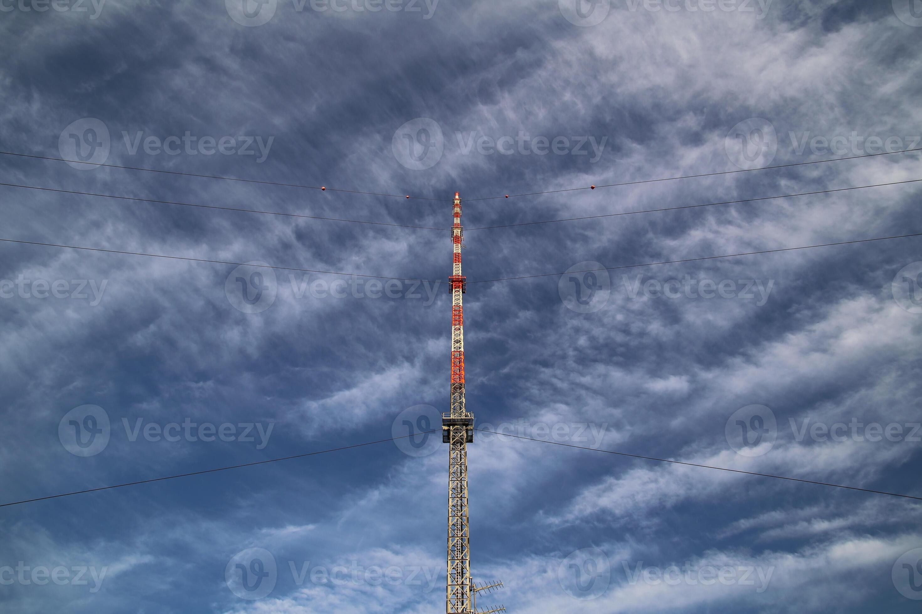 Red and white radio tower in unusual angle. 55149858 Stock Photo at Vecteezy