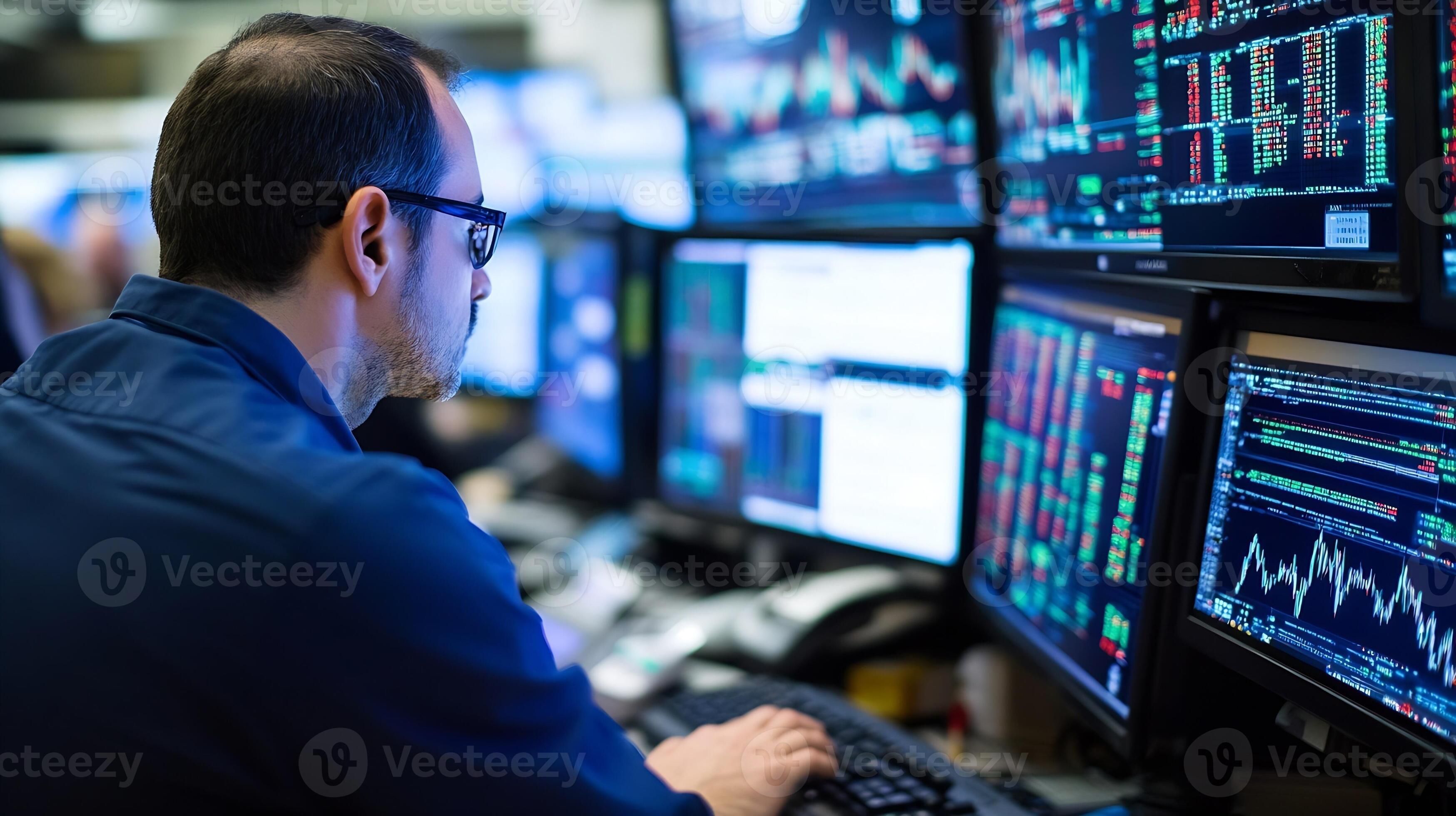 Stock Trader Analyzing Multiple Screens With Financial Data 55218355