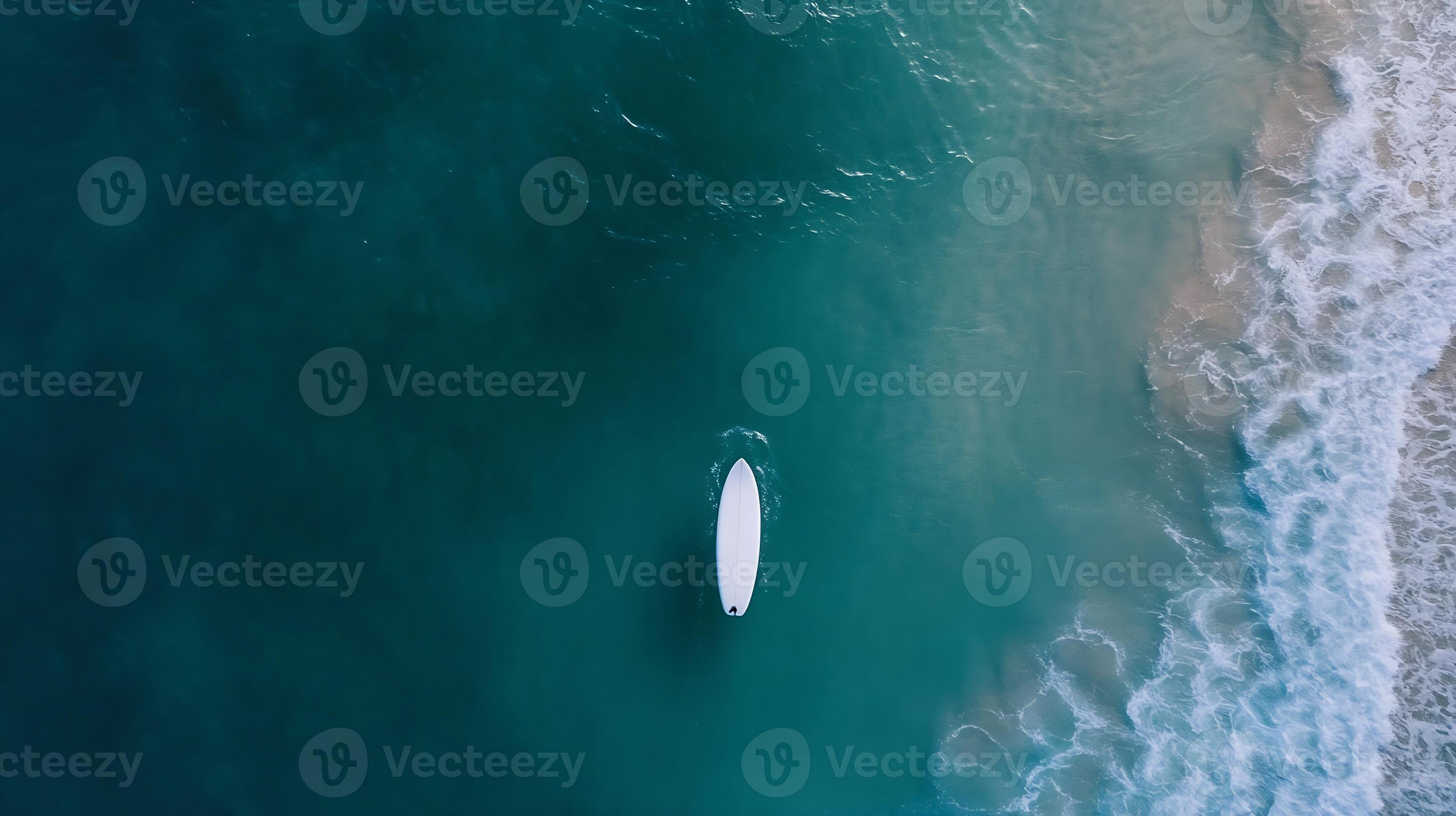 Lone Surfer on Turquoise Ocean Viewed from Above with Waves and Sandy ...