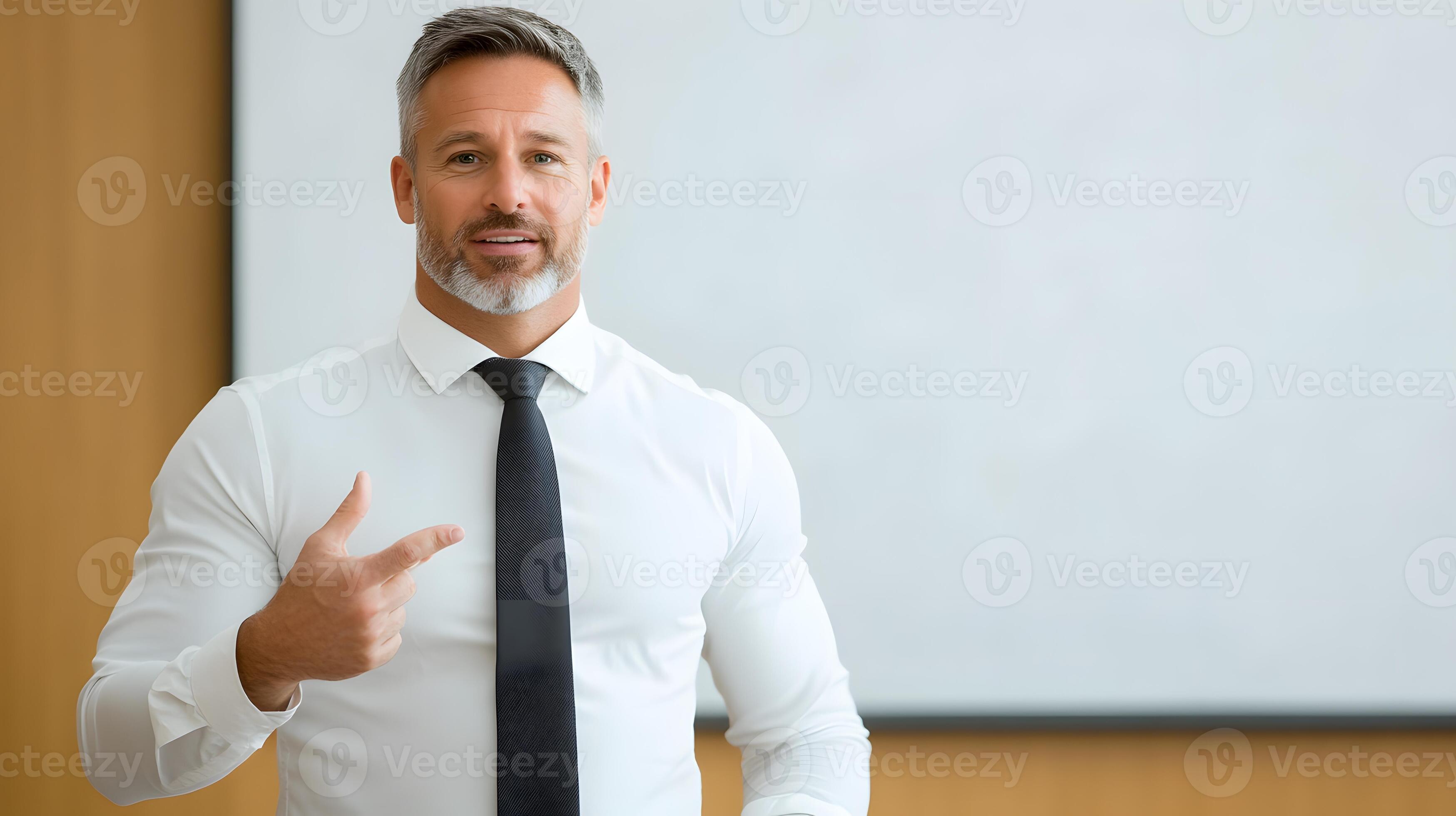 A manager giving a presentation in front of a whiteboard, explaining ideas clearly to an ...