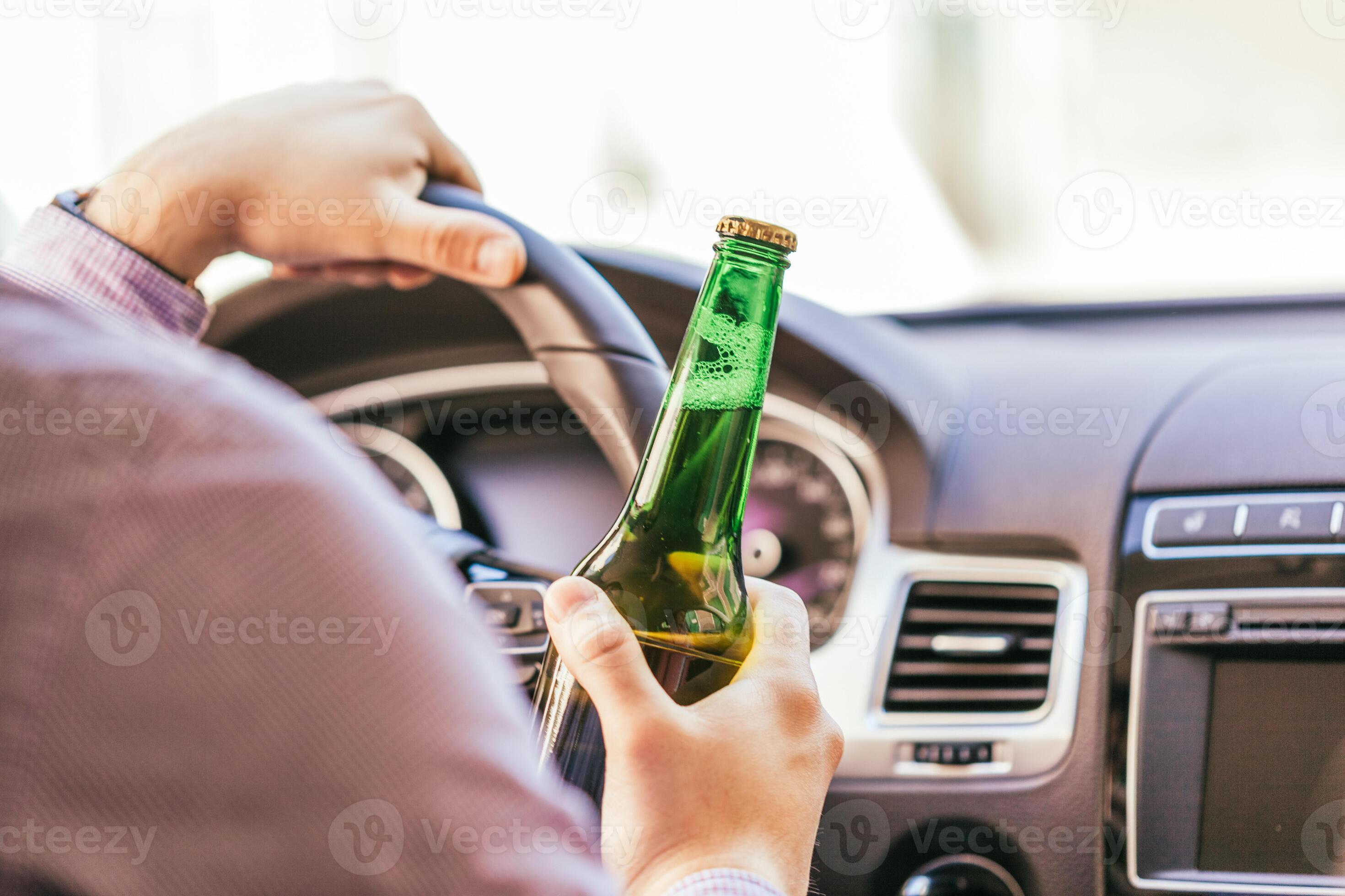 man drinking alcohol while driving the car 55253384 Stock Photo at Vecteezy