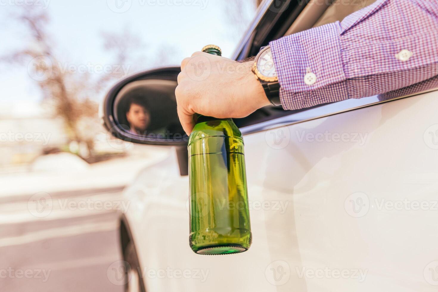 man drinking alcohol while driving the car 55255332 Stock Photo at Vecteezy