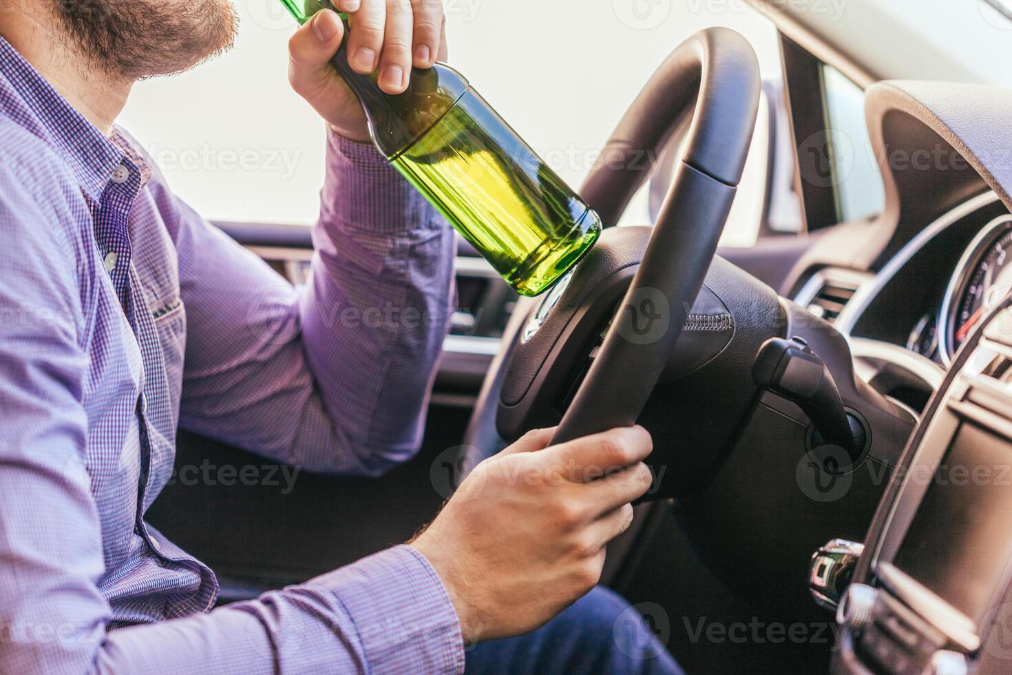 man drinking alcohol while driving the car 55259722 Stock Photo at Vecteezy