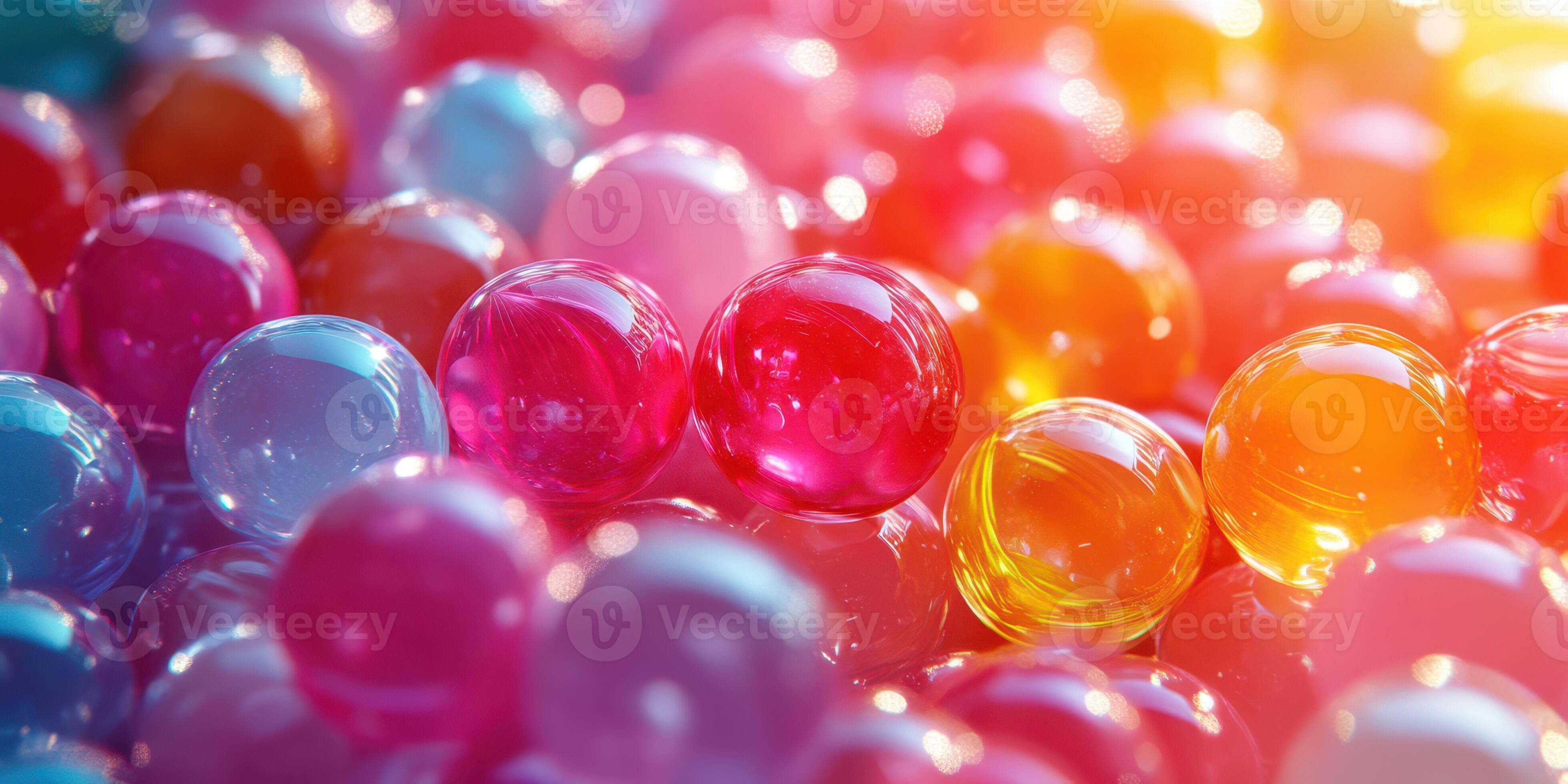 Colorful orbs resting on a reflective surface, creating a vibrant display of light and color in ...