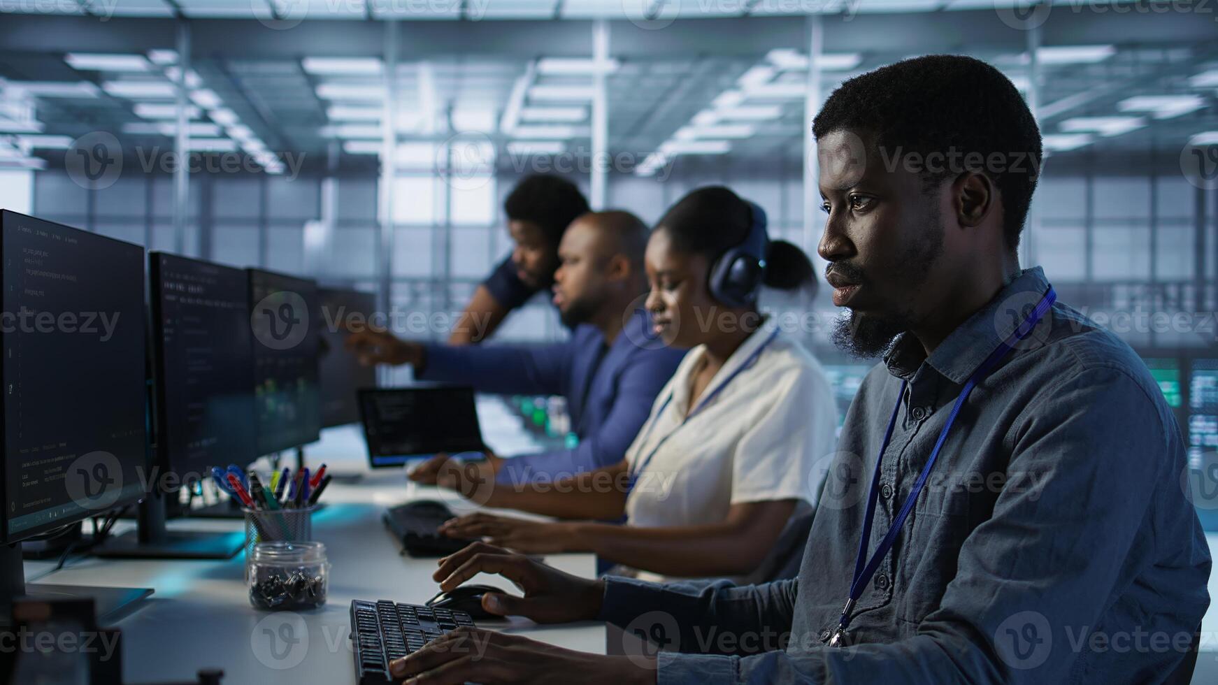 Software developers in data center implementing AI predictive maintenance systems. Focus on man ...