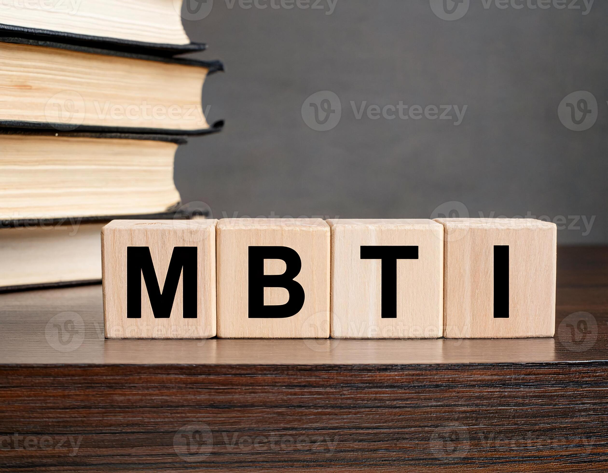 MBTI Letters on Wooden Blocks Surrounded by Books on Desk 55526050 Stock Photo at Vecteezy