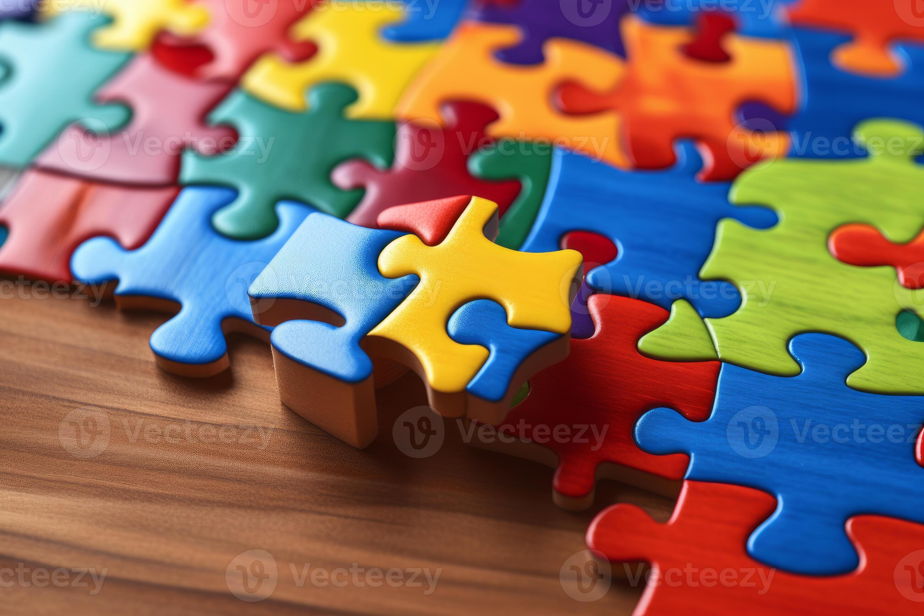 Colorful jigsaw puzzle pieces connecting on wooden table 55698335 Stock ...