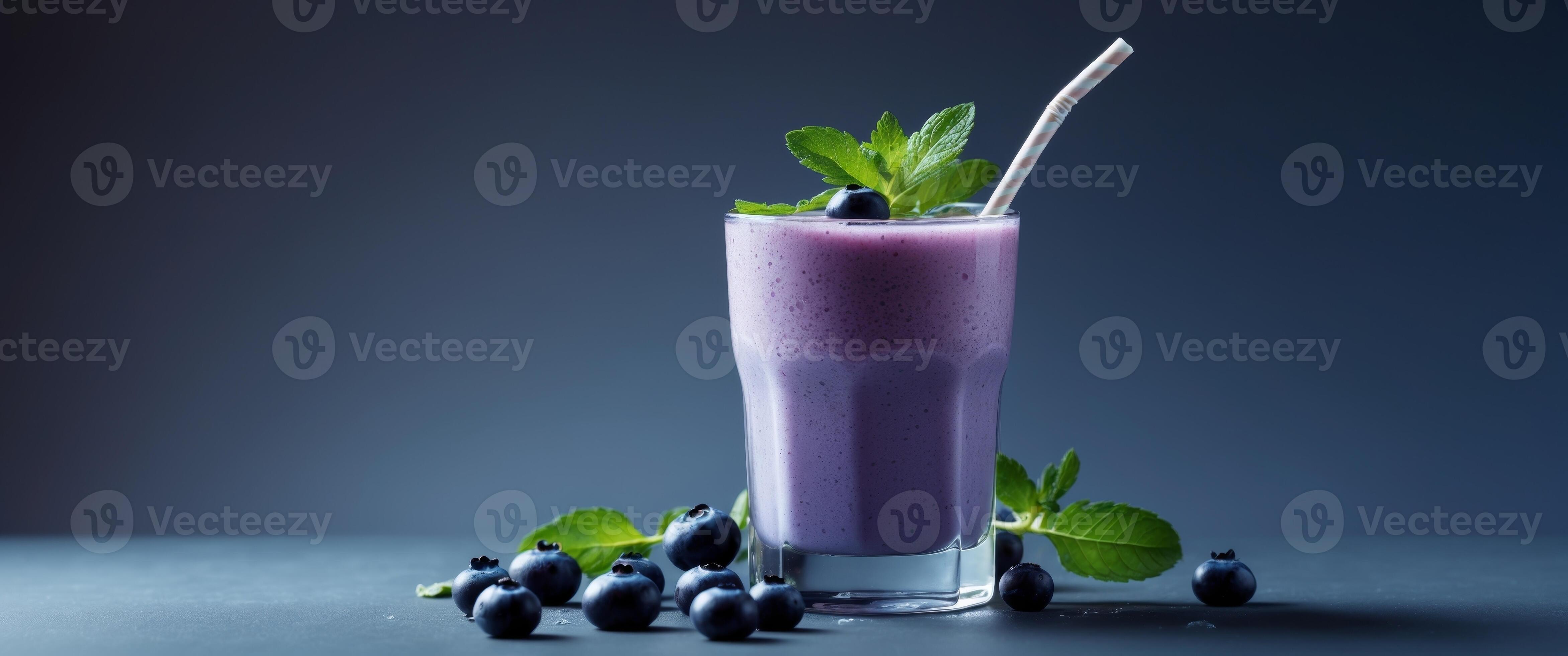 Refreshing Blueberry Smoothie with Mint Garnish and Straw on Dark Background 55847590 Stock ...