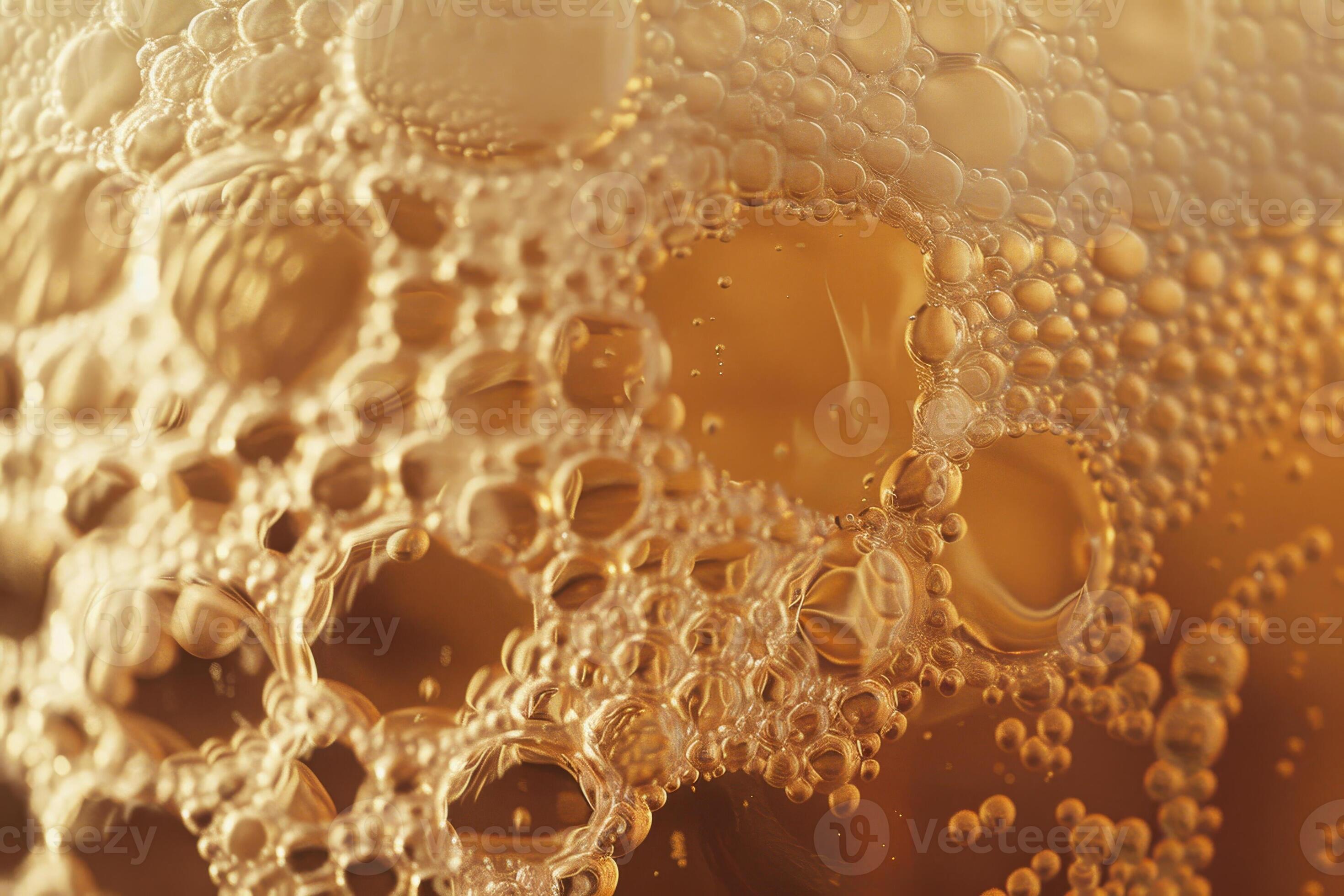 The close-up view reveals countless bubbles rising in a fizzy drink, showcasing the texture and ...