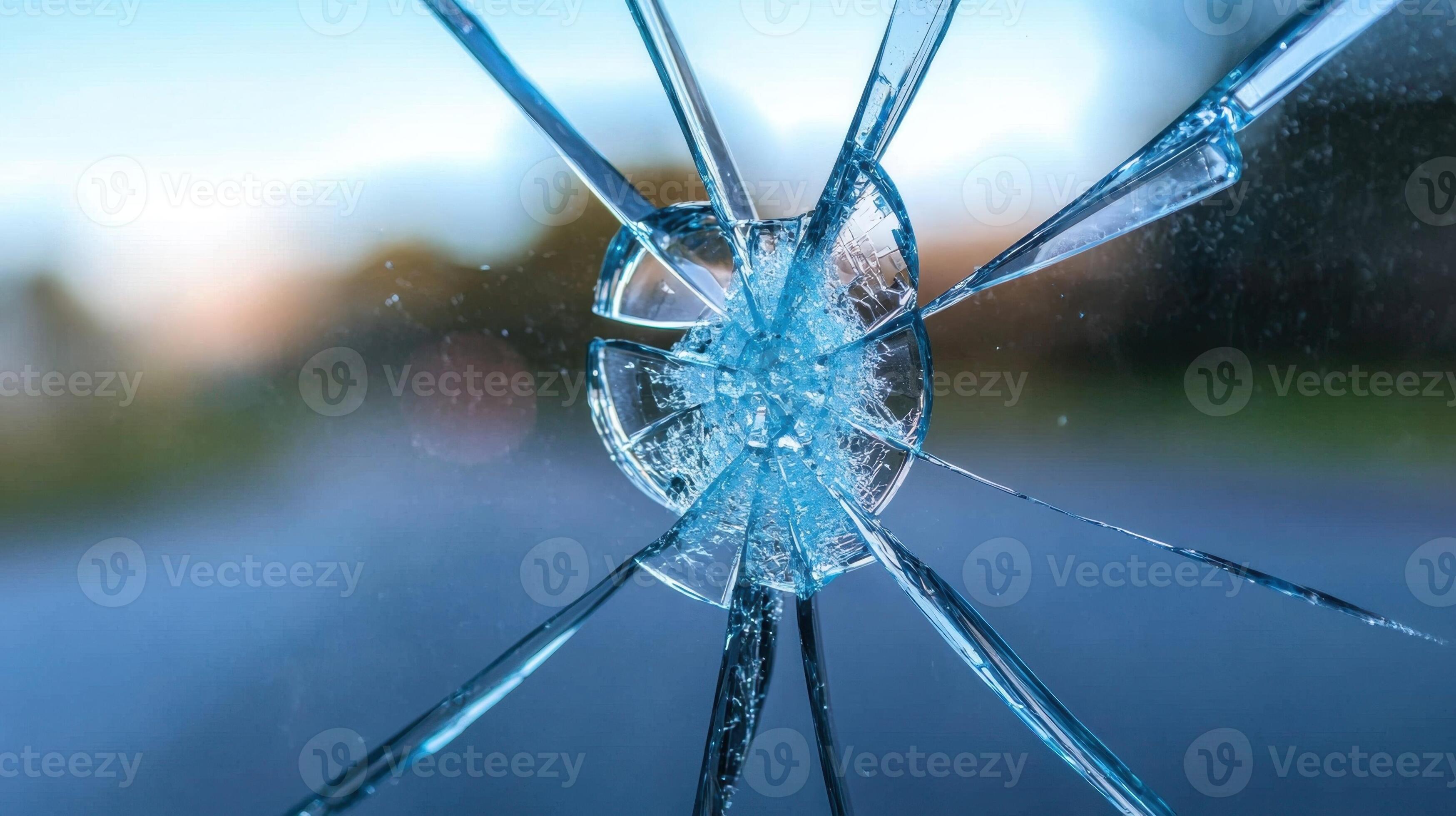 A shattered window with a blue tint 55947224 Stock Photo at Vecteezy