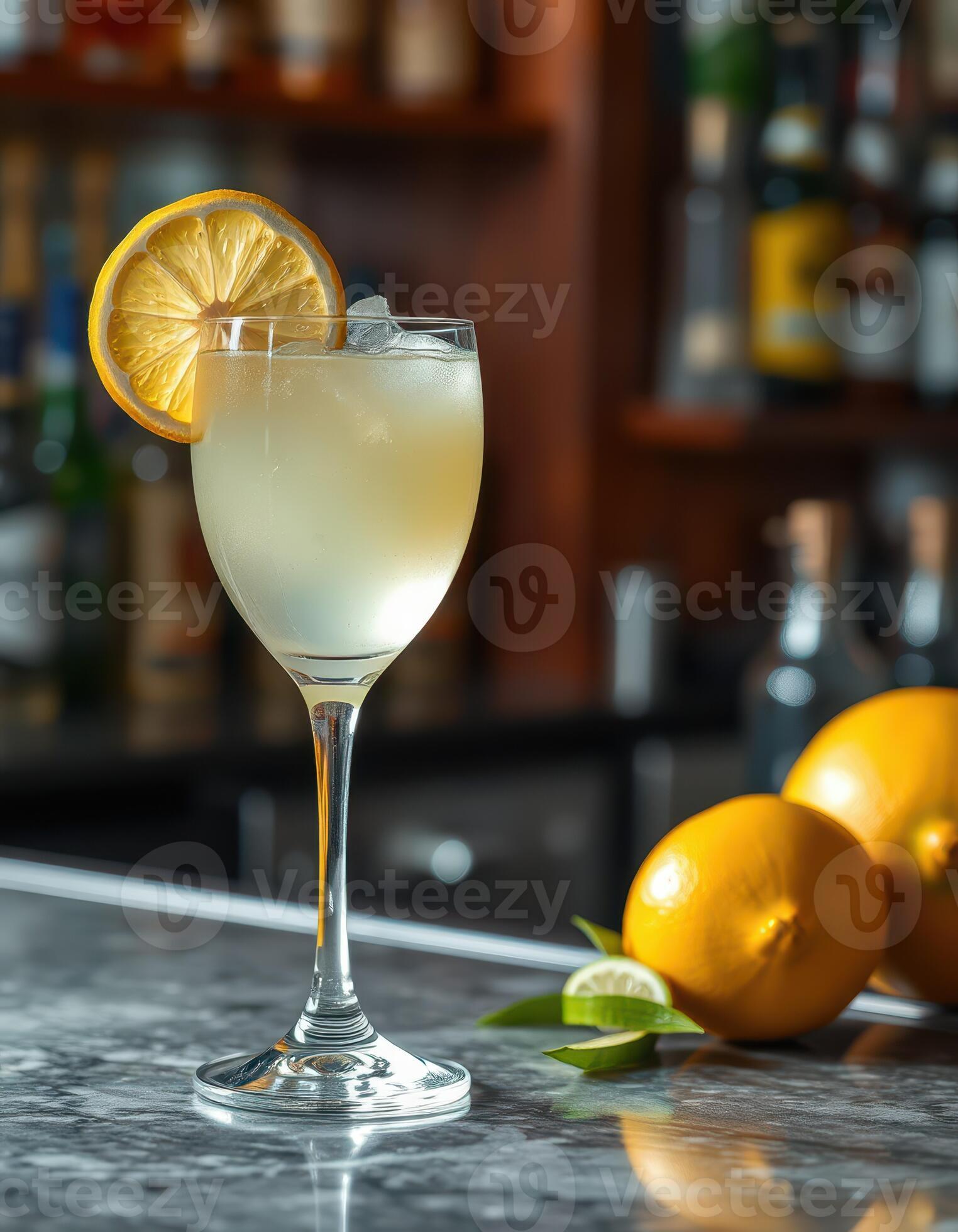 Refreshing citrus cocktail served in a tall glass with lemon slice on the rim at a vibrant bar ...