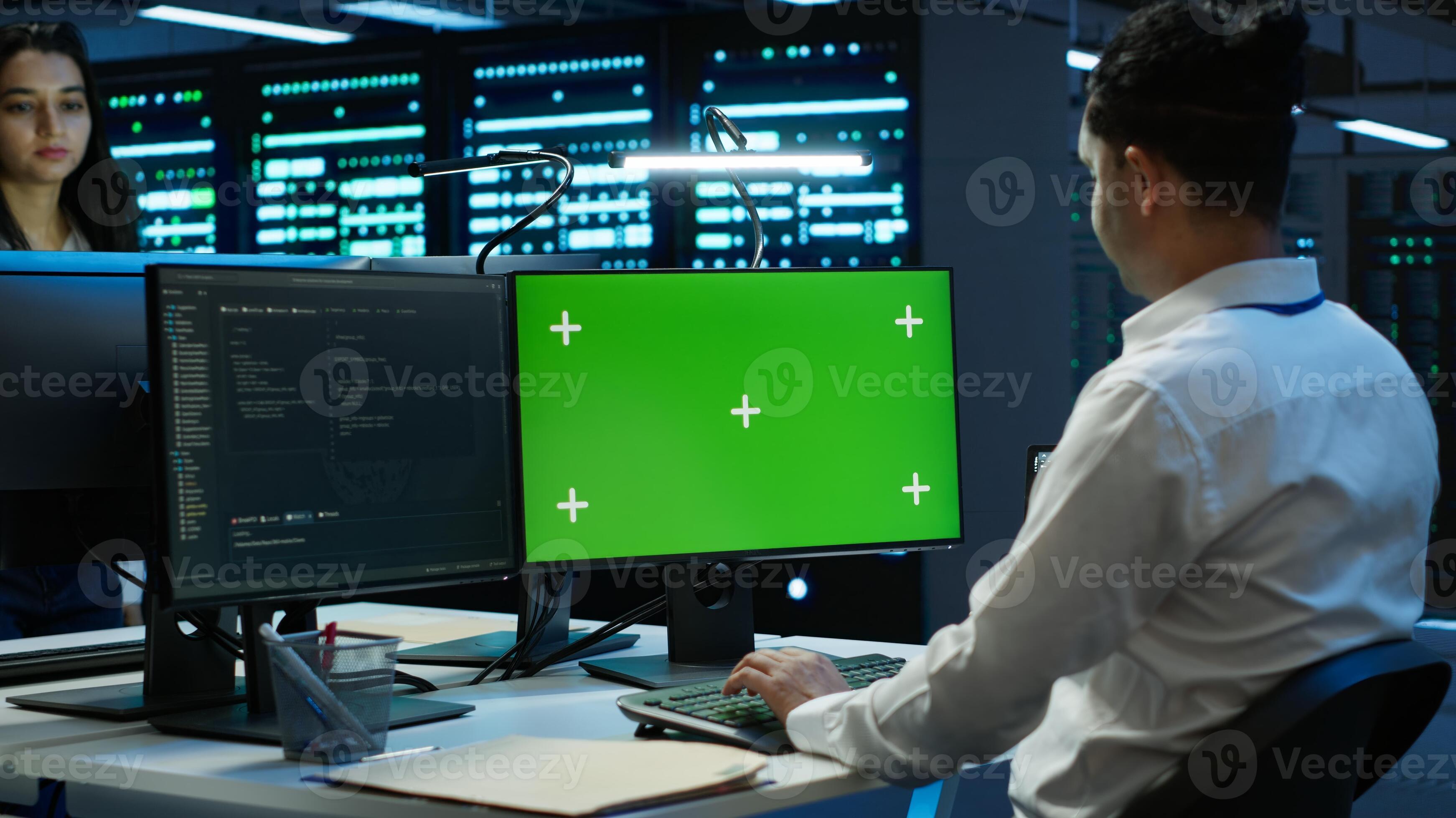 Programmer Overseeing Data Center Using Isolated Screen Computer