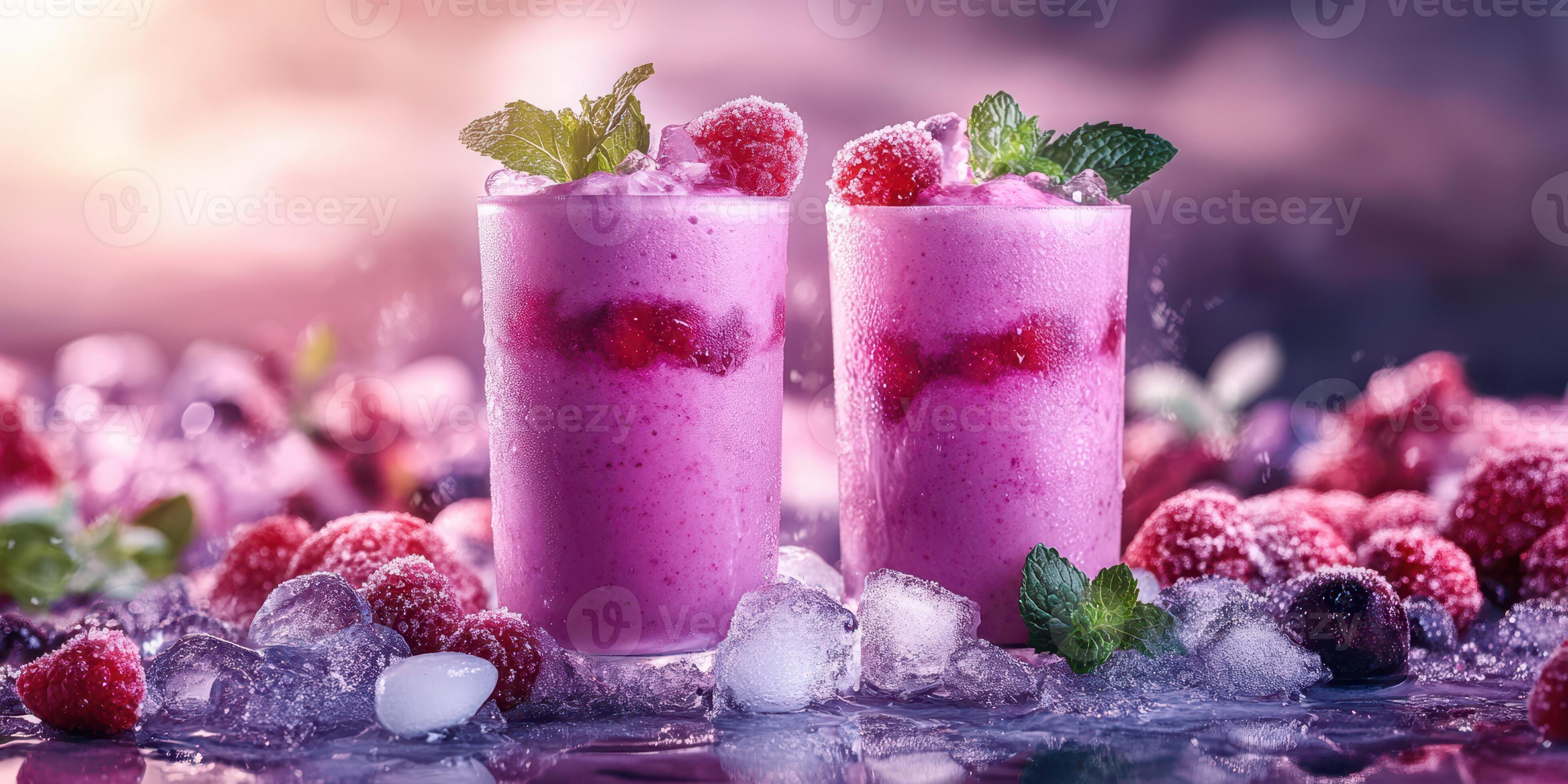 Refreshing raspberry smoothies served in glasses with ice and mint at a summer gathering in a ...